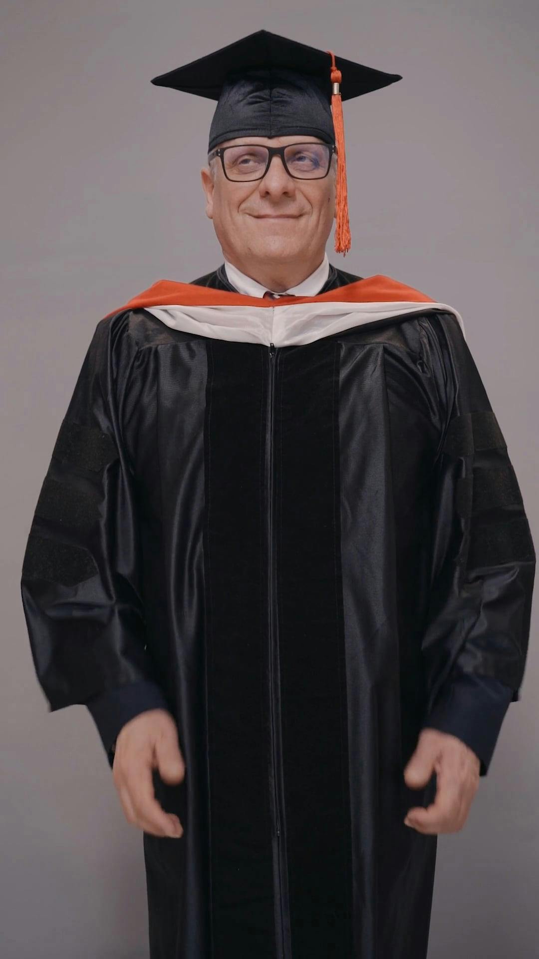 A Director Wearing Graduation Gown and Cap · Free Stock Video