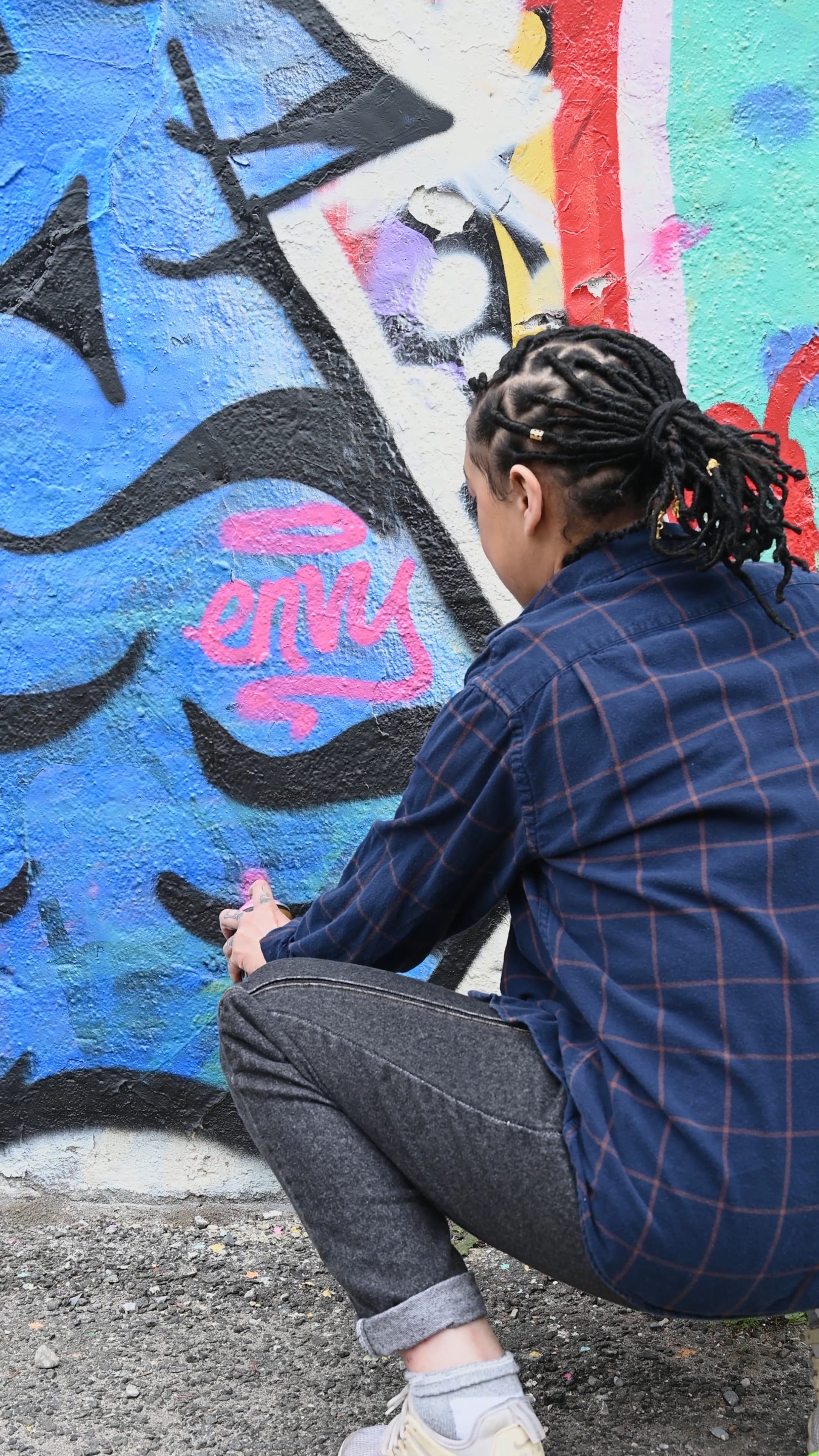 Woman Spray Painting on the Wall · Free Stock Video