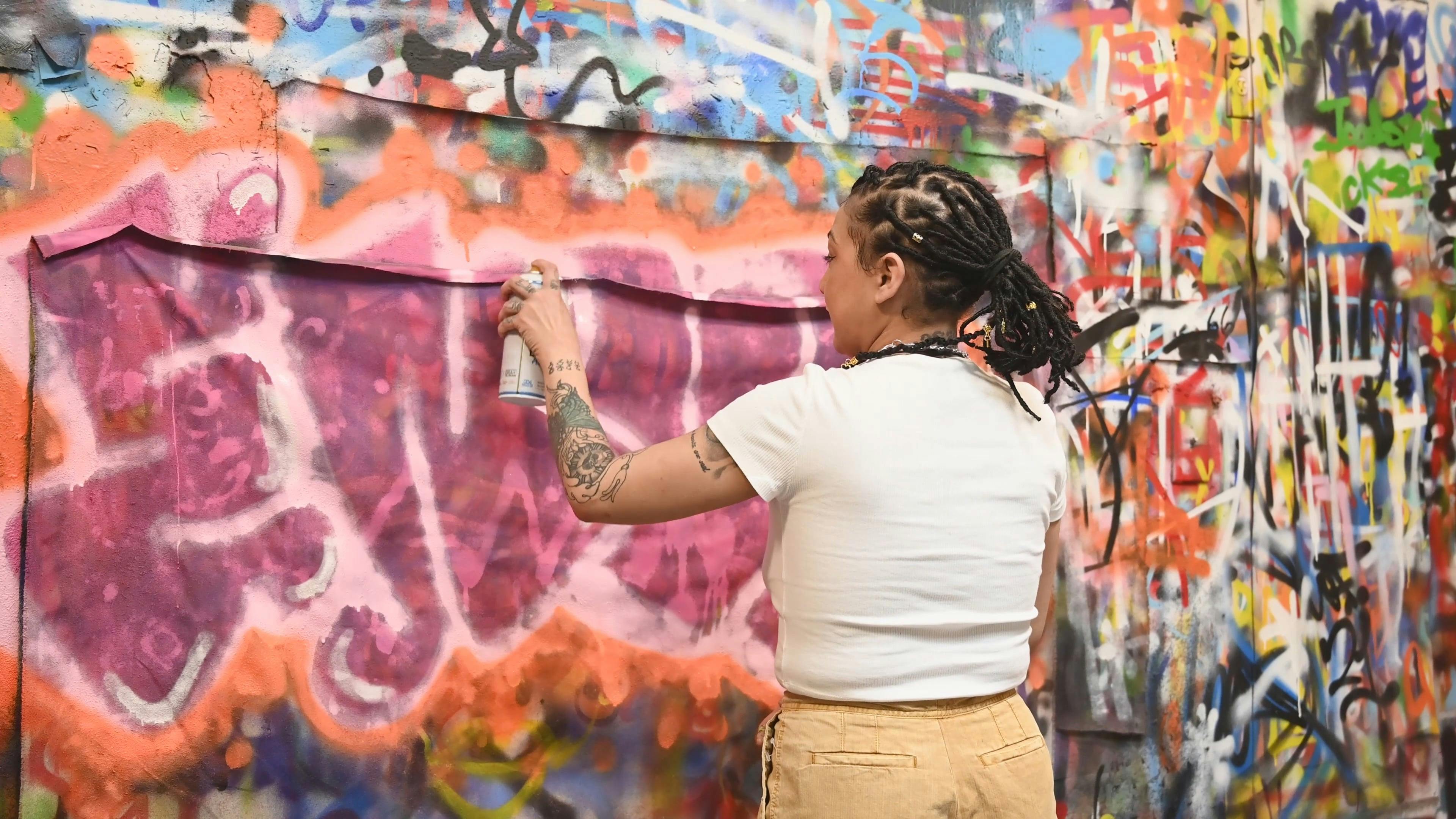 Woman Spray Painting on the Wall Free Stock Video Footage, Royalty-Free ...