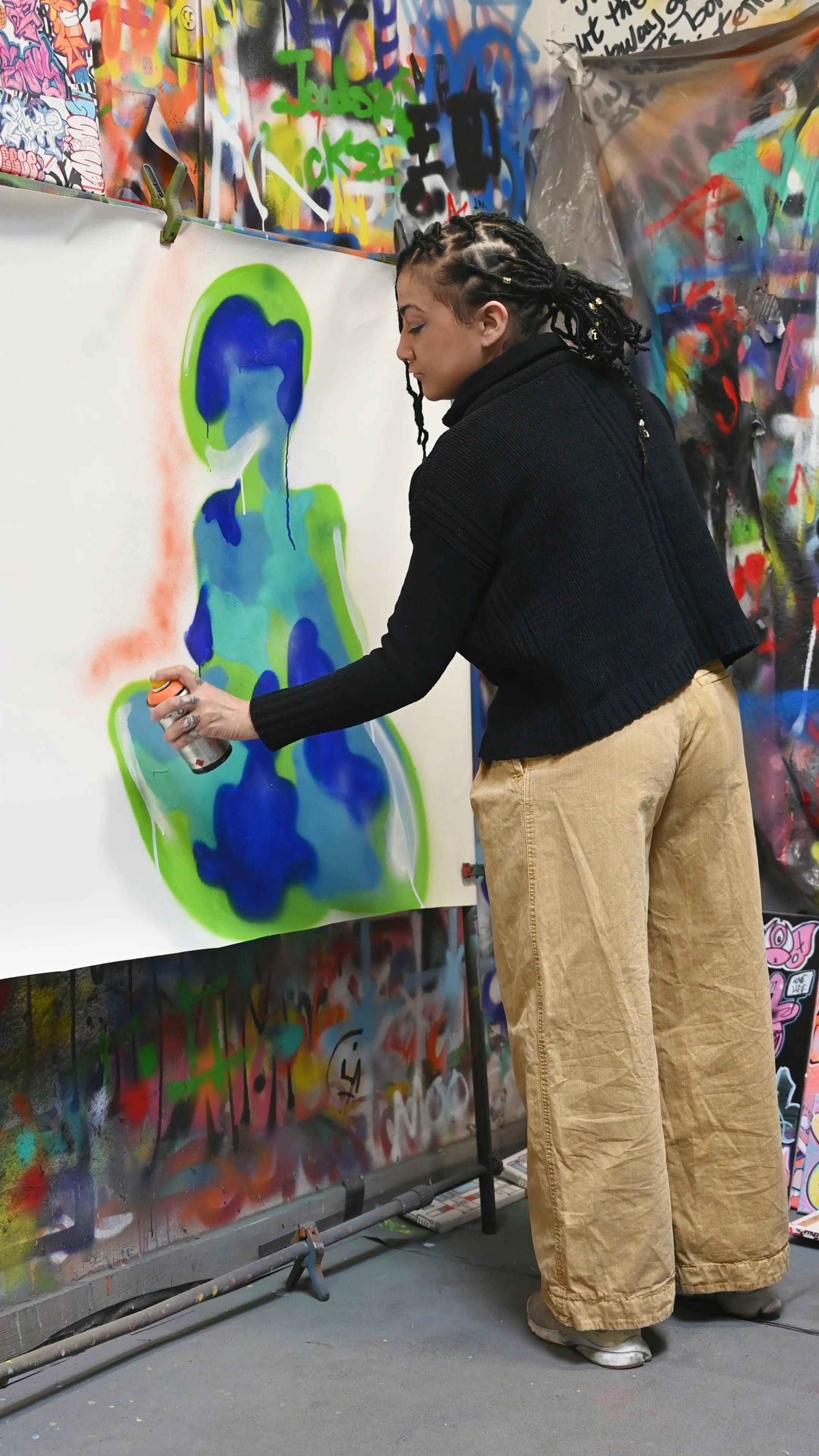 Woman Spray Painting on Canvas Free Stock Video Footage, Royalty-Free ...