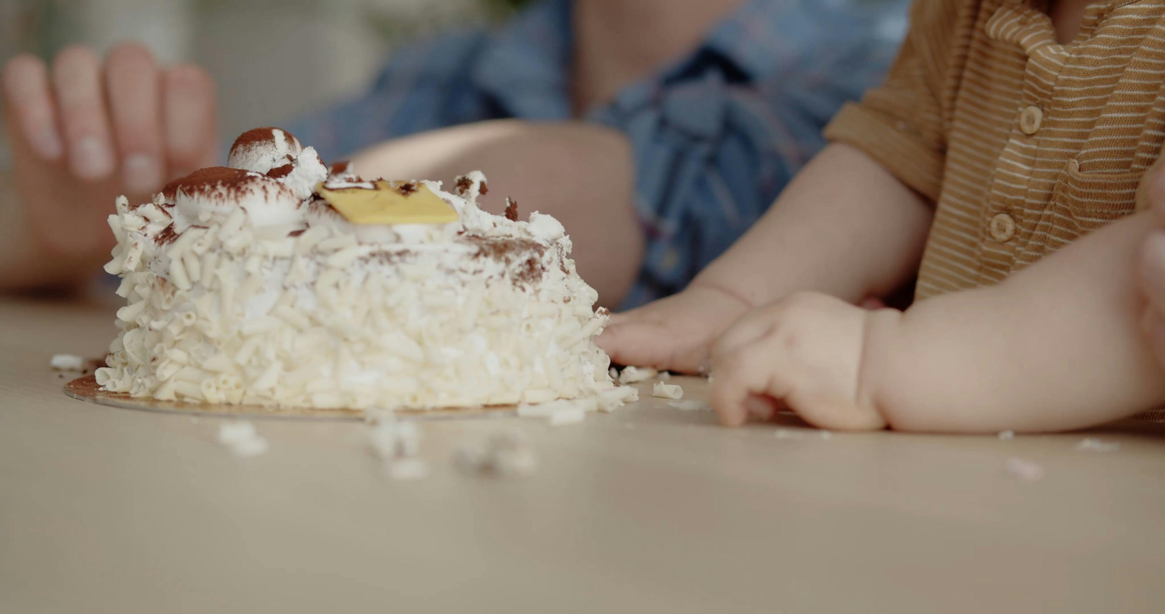 Close Up Shot of a Baby Eating Cake · Free Stock Video