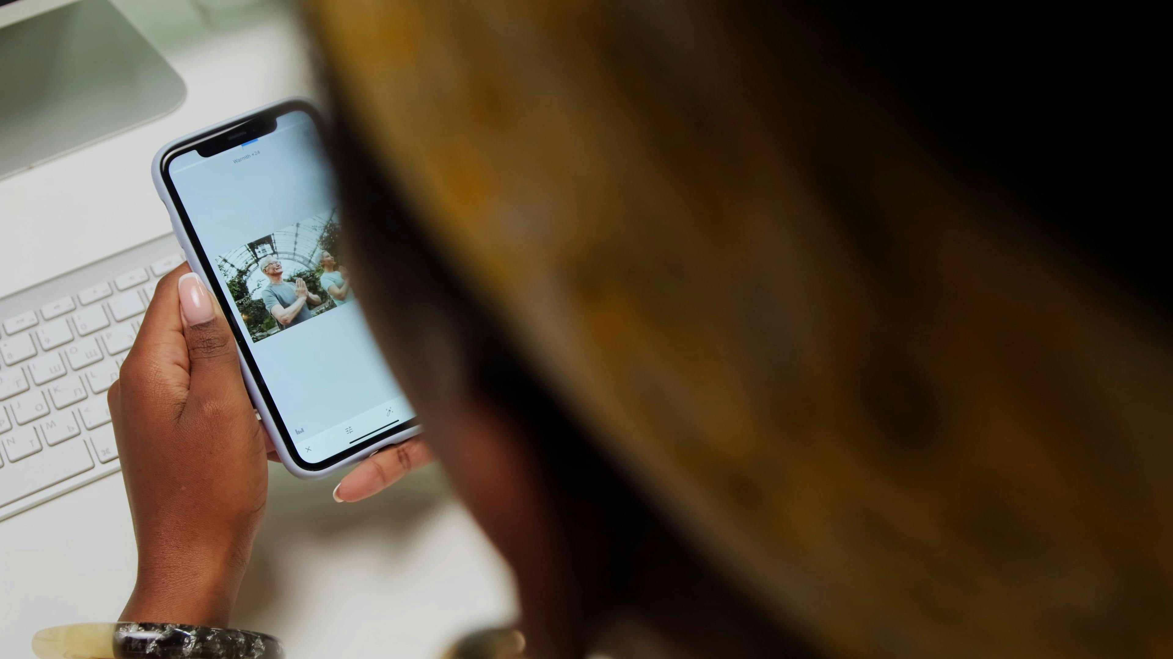 Person Editing a Photo using Mobile Phone · Free Stock Video