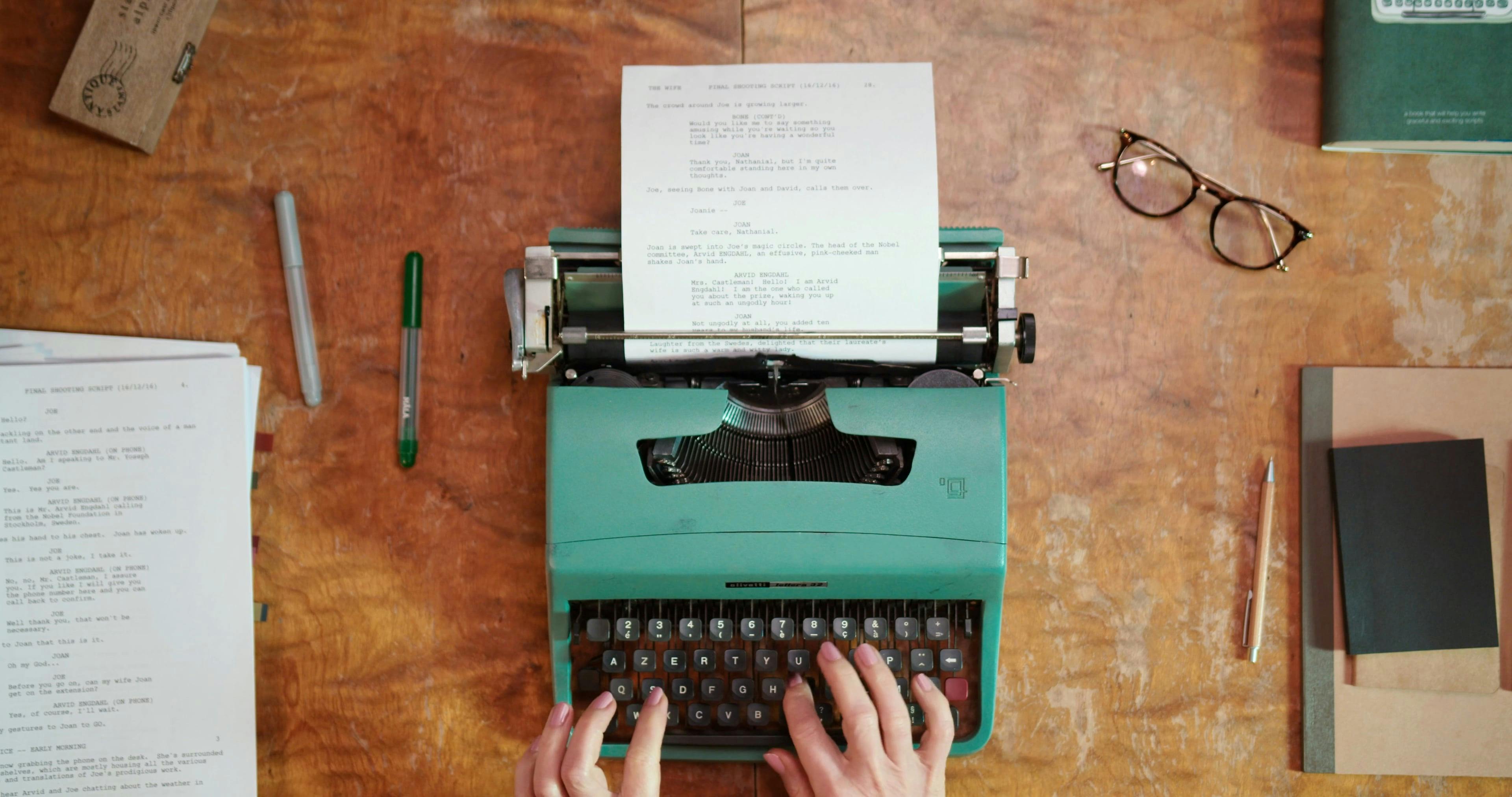 A Person Typing using a Typewriter · Free Stock Video