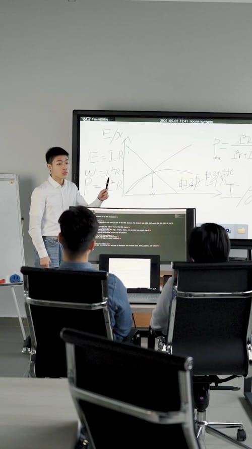 A Man Presenting in Front of People · Free Stock Video A Man Presenting in Front of People · Free Stock Video