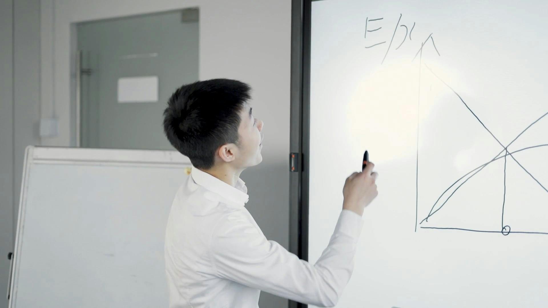 A Man Using an Interactive Board in a Discussion · Free Stock Video
