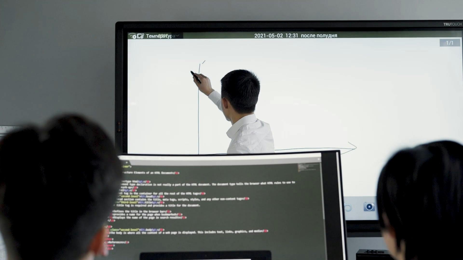 A Man Drawing on the Digital Board · Free Stock Video