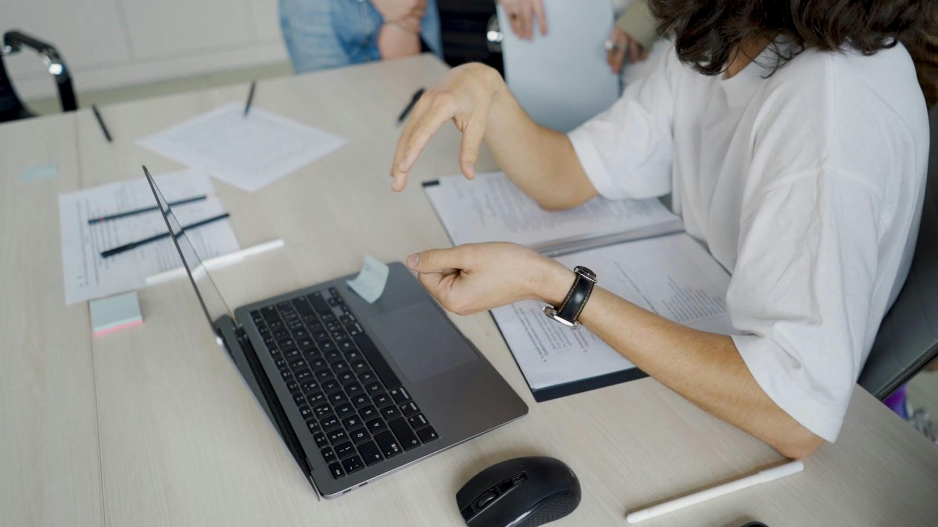 Office Team Talking while on the Table · Free Stock Video