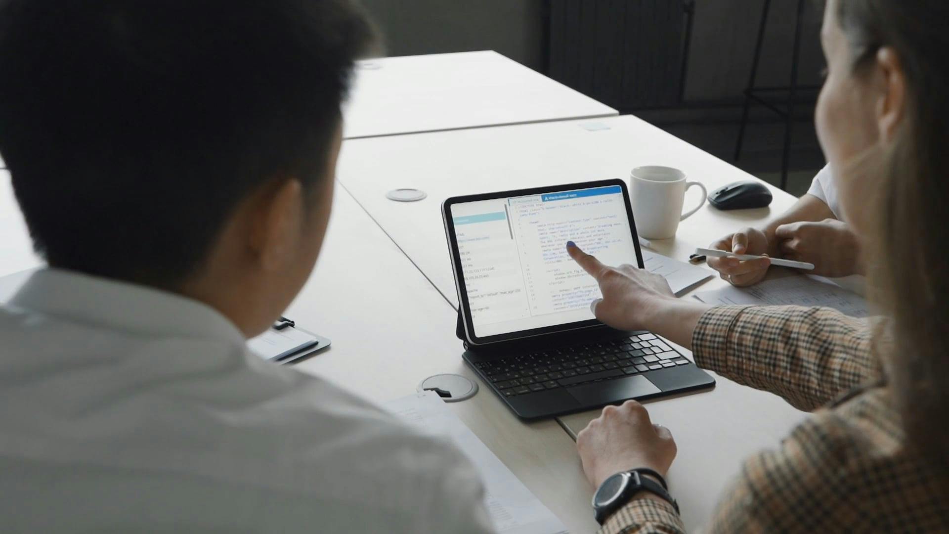 Office Team Talking while on the Table · Free Stock Video