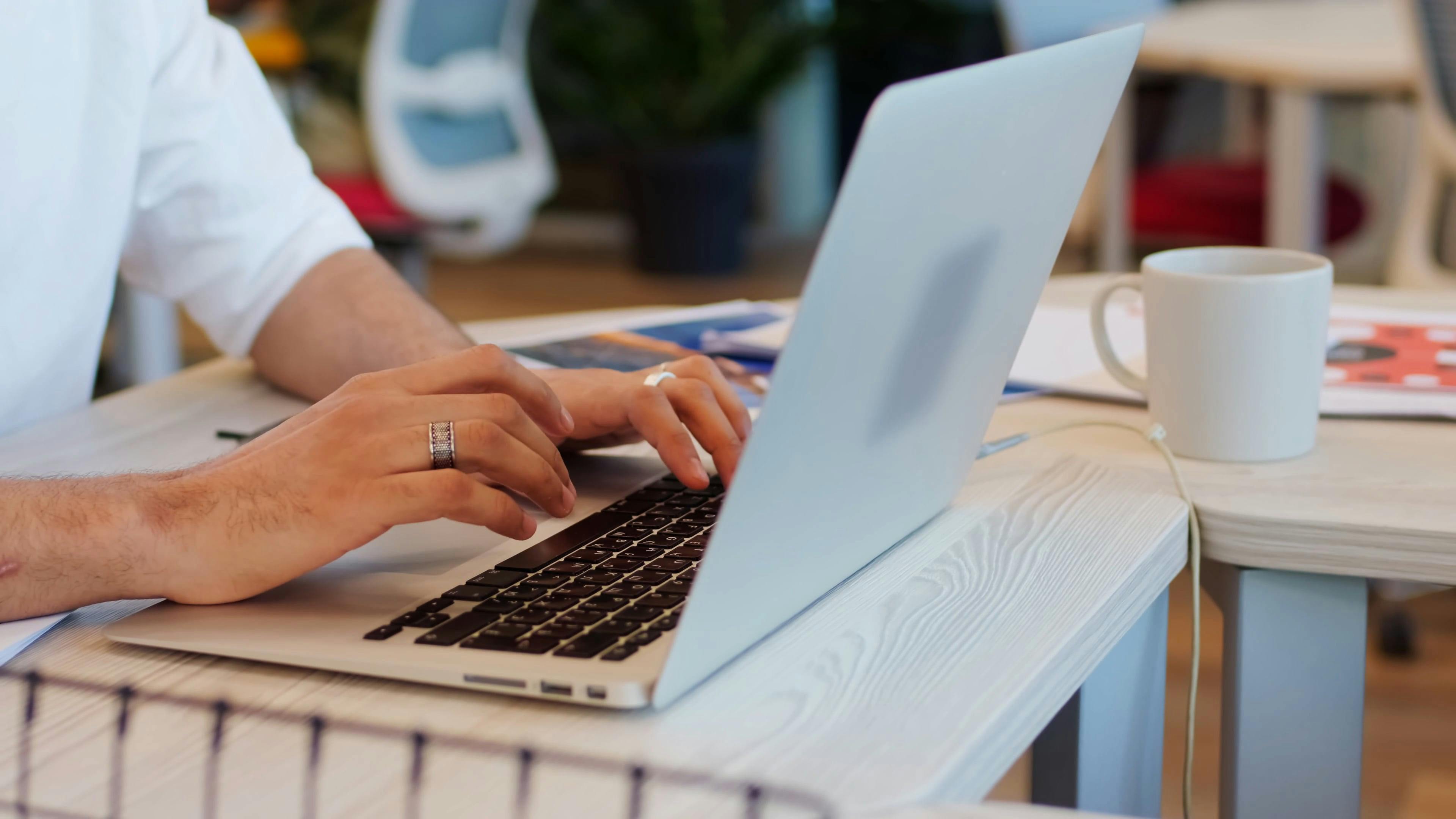 A Group Of People Busy Typing On Their Laptop Keyboards · Free Stock Video