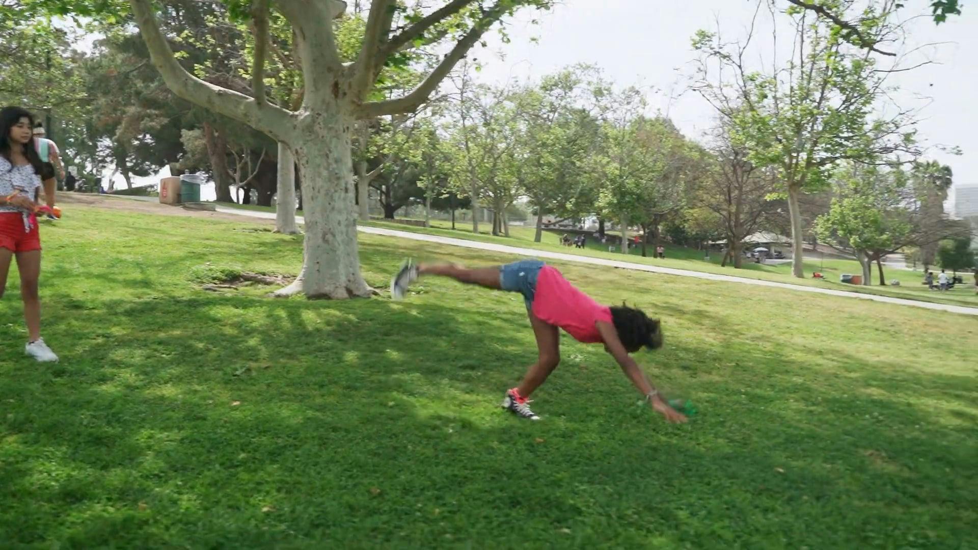 Girl Tumbling in the Park · Free Stock Video