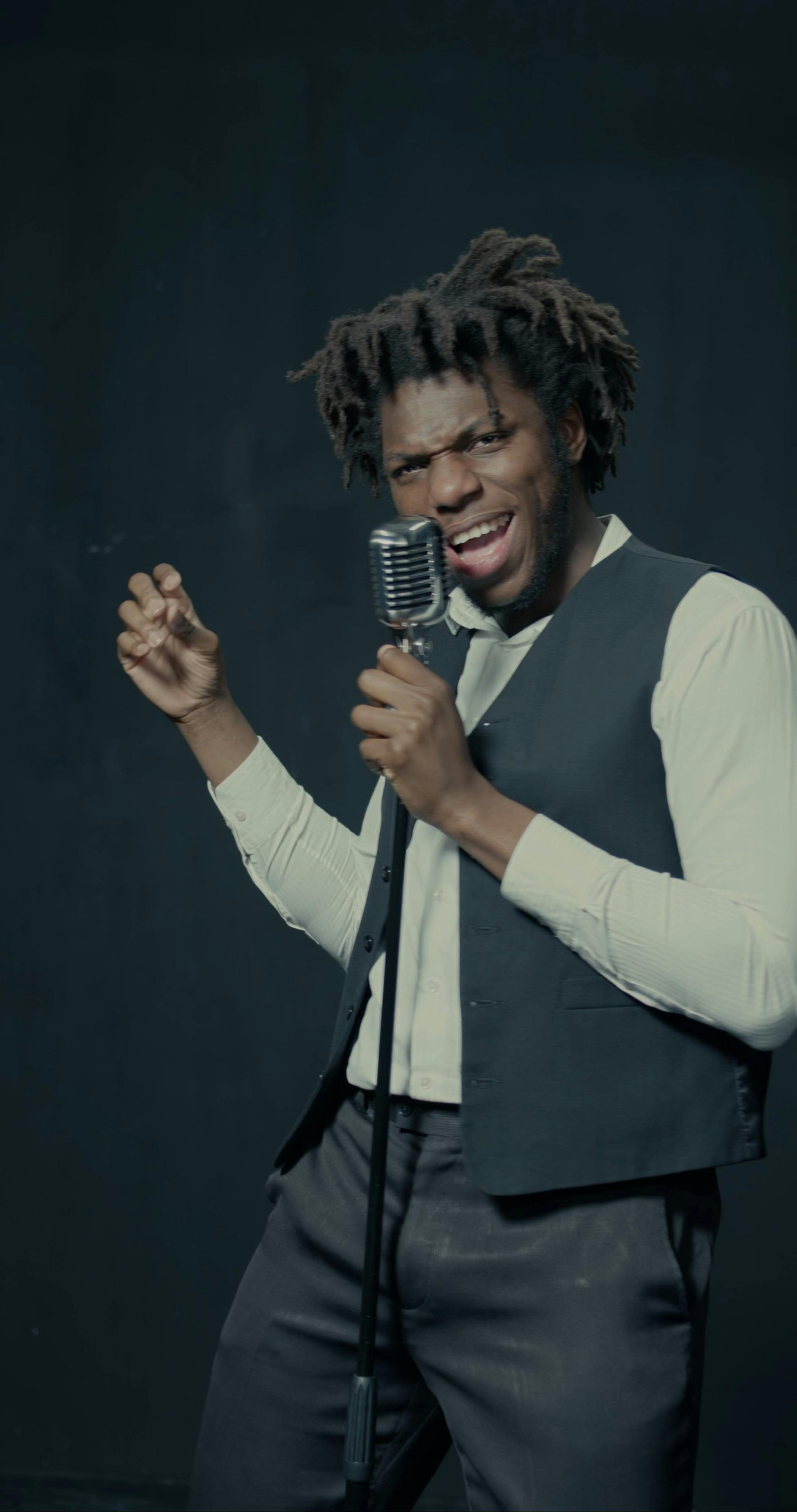 Video of a Man using Microphone Free Stock Video Footage, Royalty-Free ...