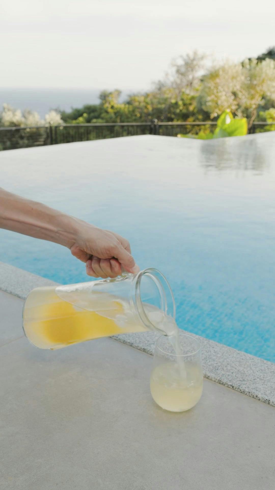 Person Pouring Cold Juice Into A Glass Free Stock Video Footage ...