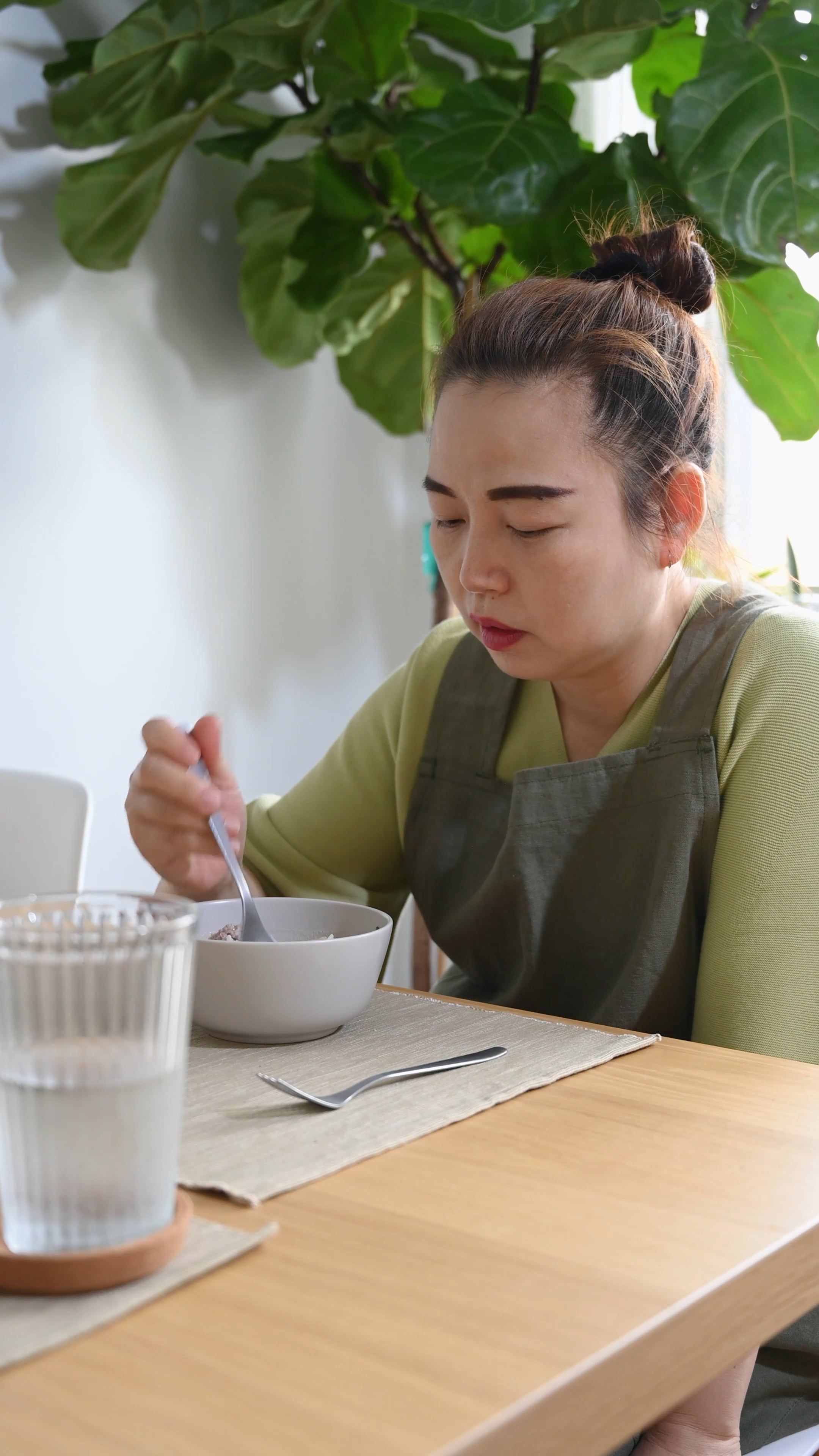 A Woman Blowing Hot Food on a Spoon Free Stock Video Footage, Royalty ...