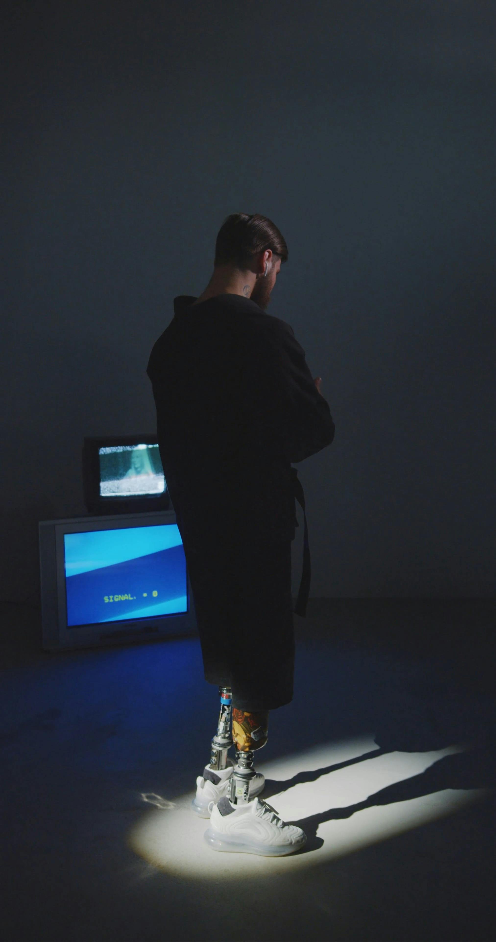 Video of Man Standing Near Televisions · Free Stock Video