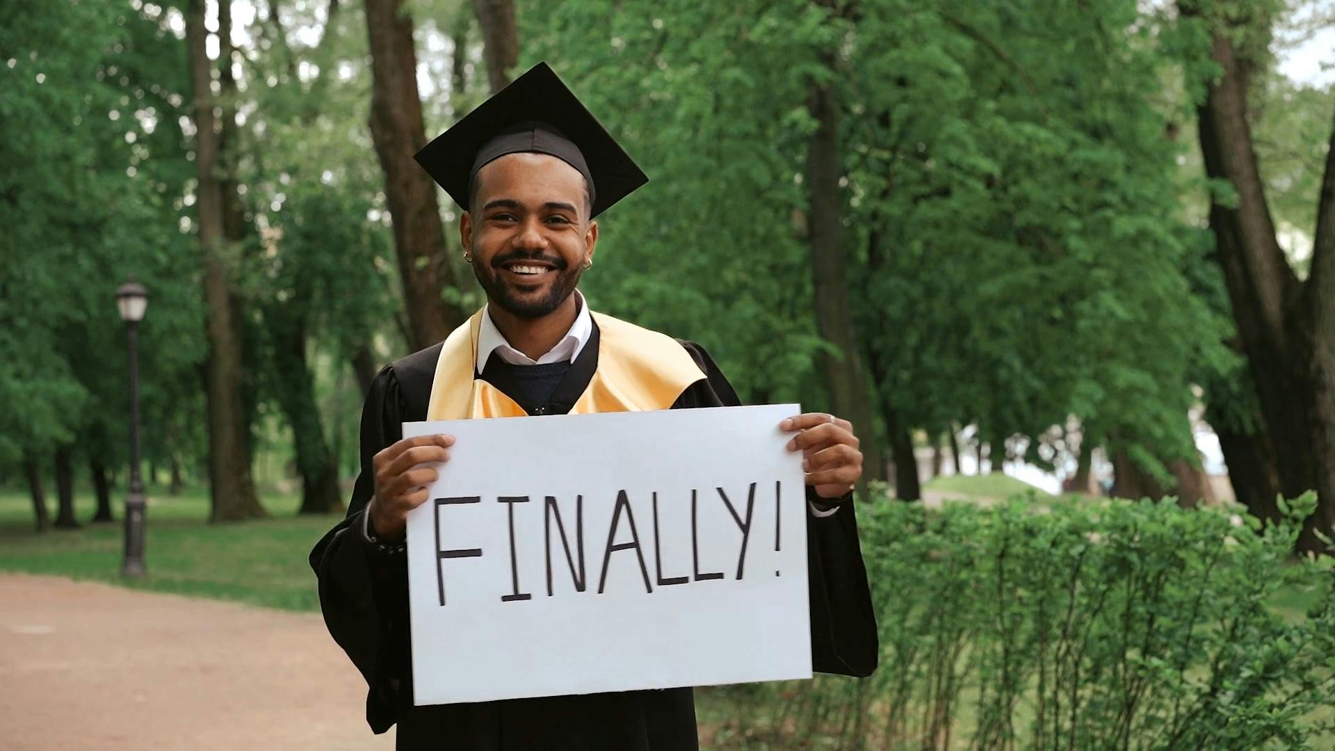 Graduate Posing On Camera · Free Stock Video