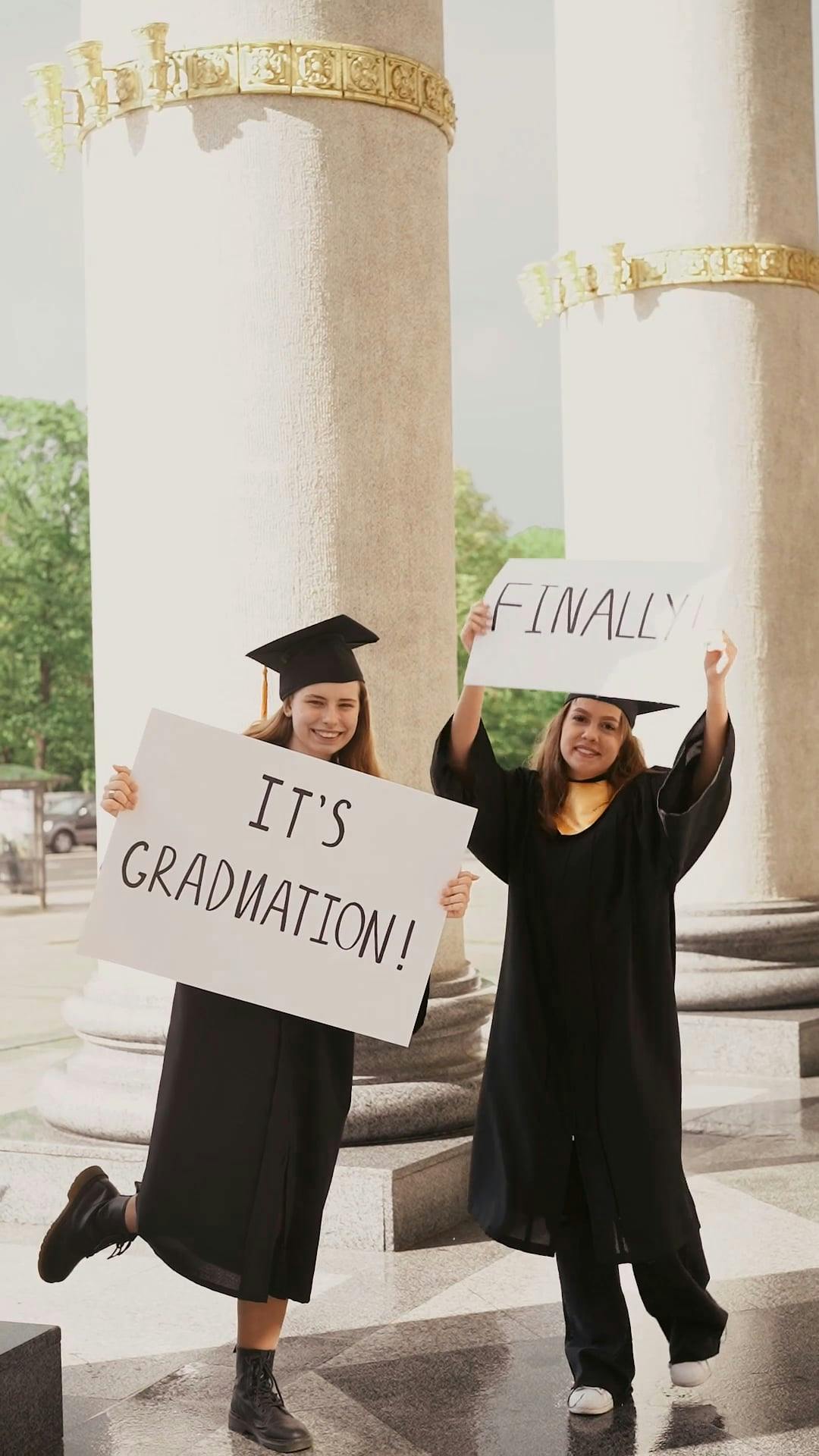 Graduates Wearing their Graduation Gowns · Free Stock Video