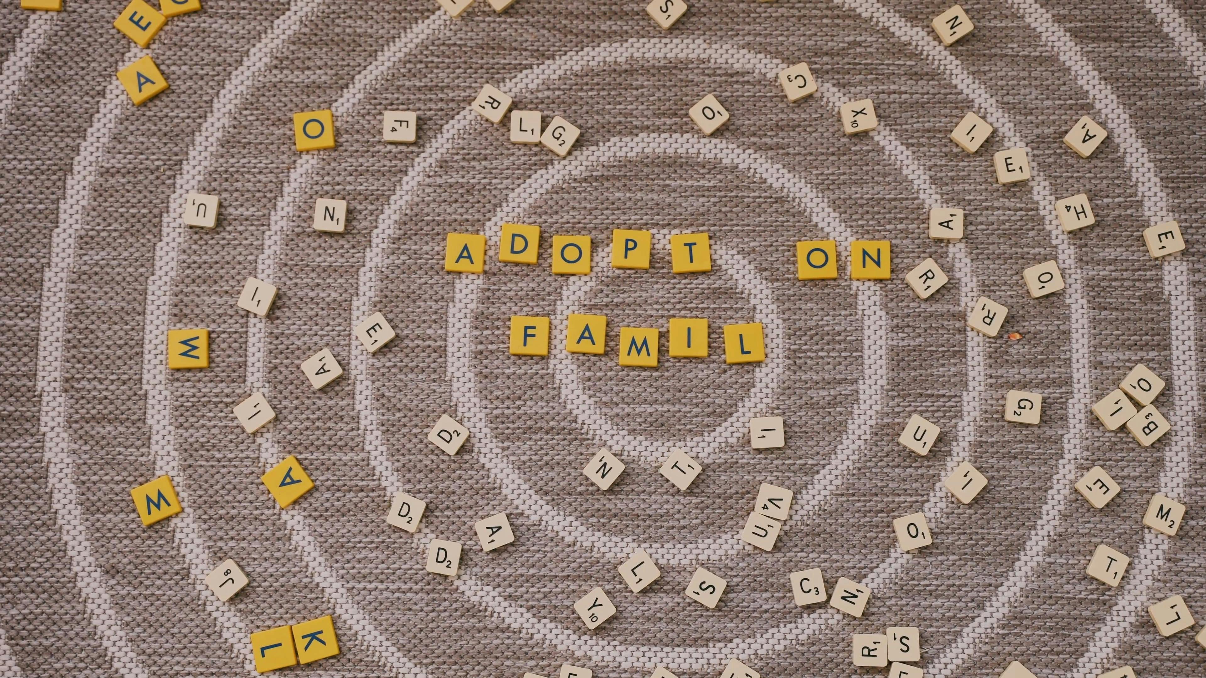 Scrabble Tiles Scattered on the Brown Carpet · Free Stock Video