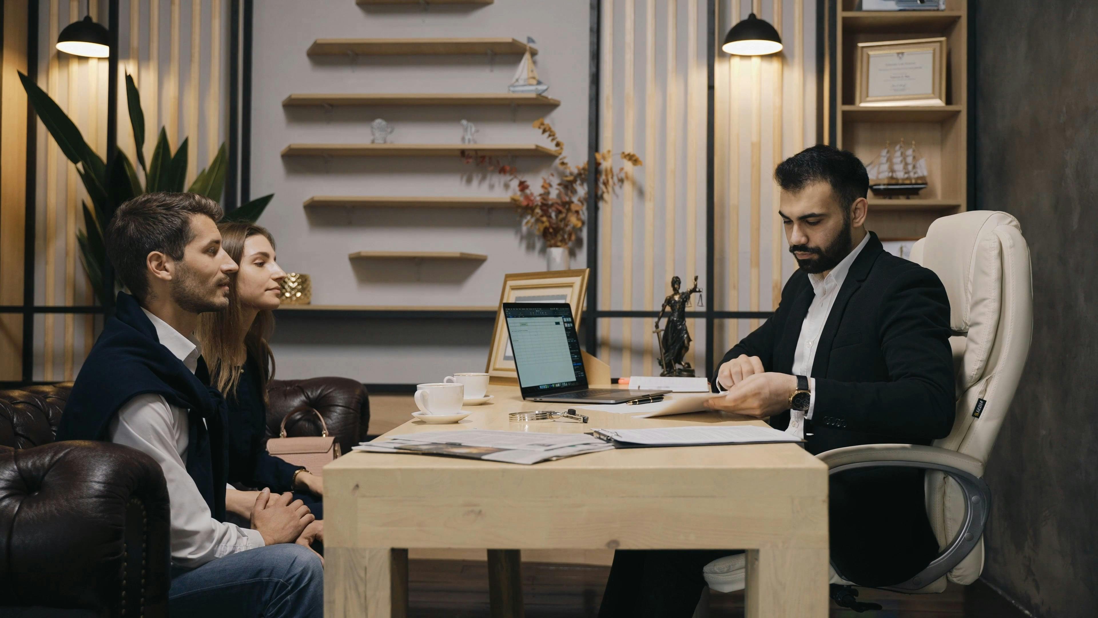 Man Talking to the Couple while Explaining the Contract Free Stock ...