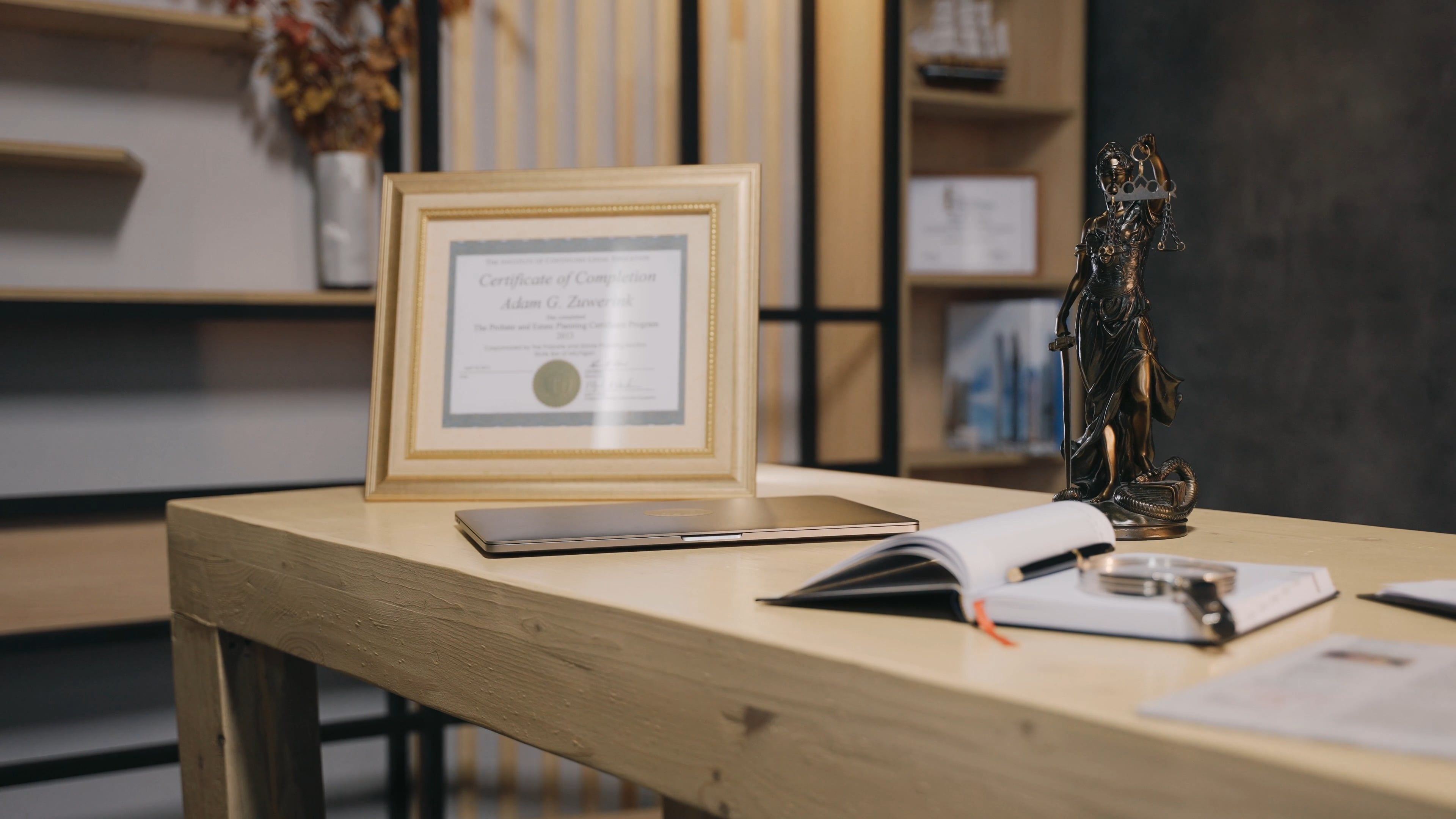Lady Justice Statue Over Desk · Free Stock Video