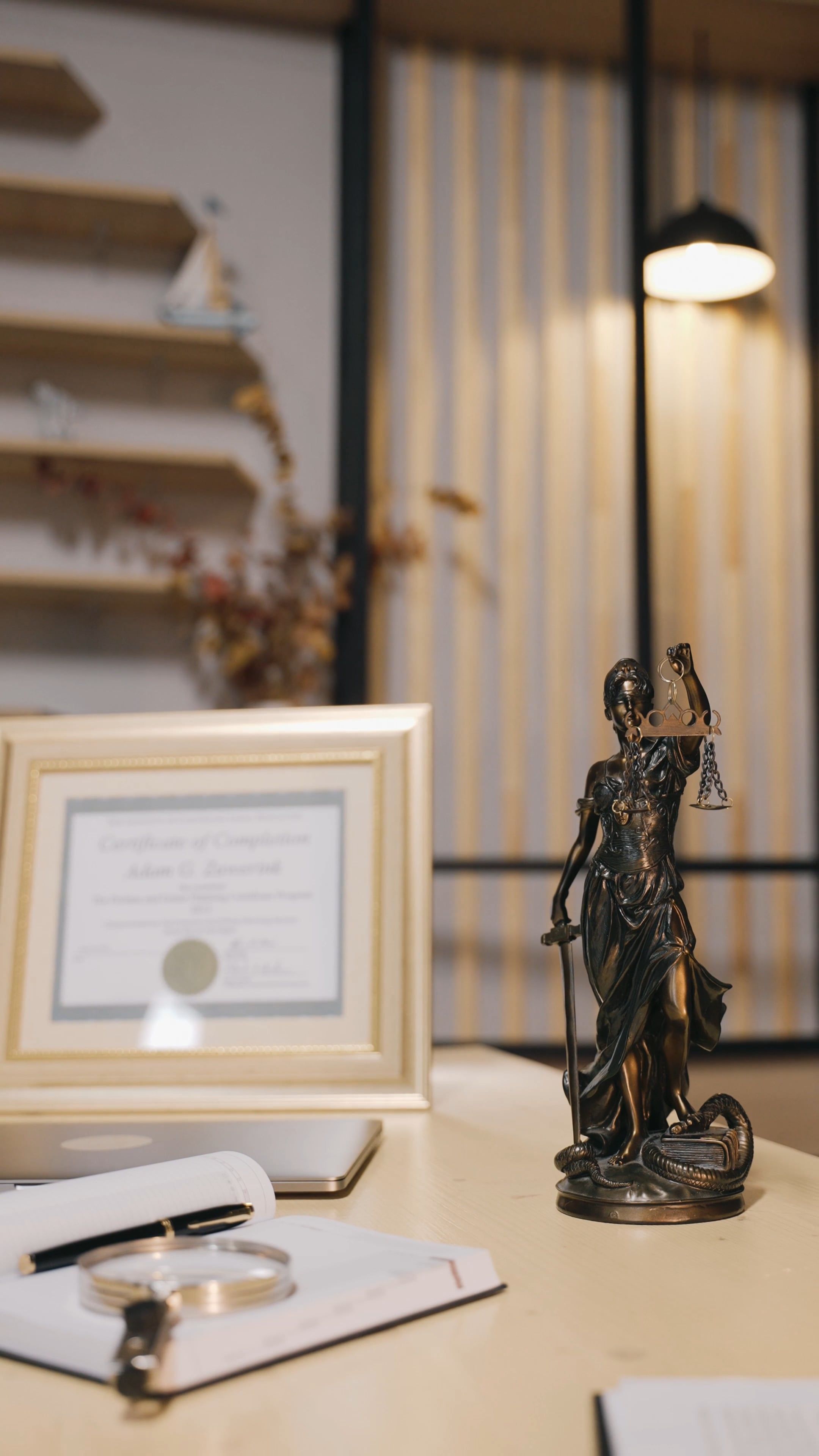 Lady Justice Statue Over Desk · Free Stock Video