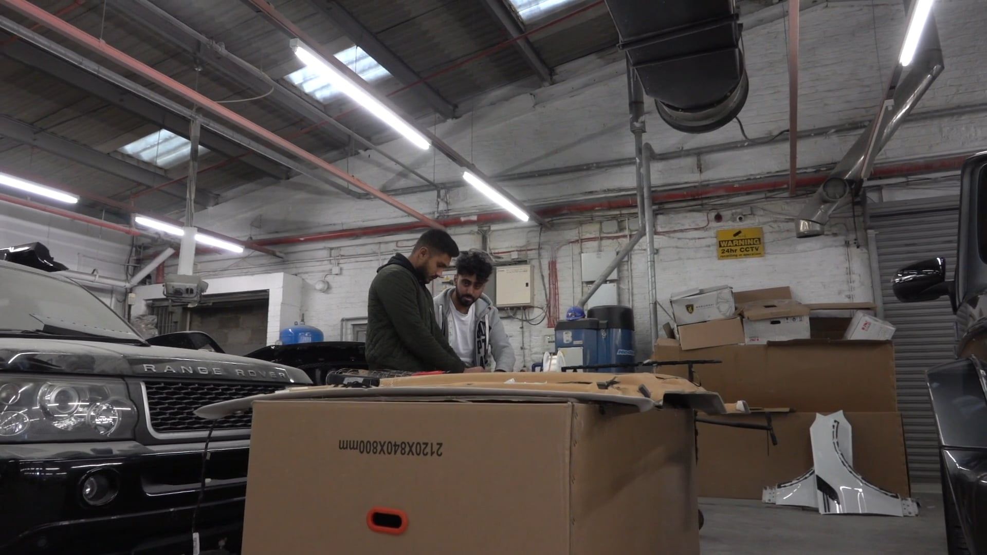 Men Working at the Garage Free Stock Video Footage, Royalty-Free 4K ...