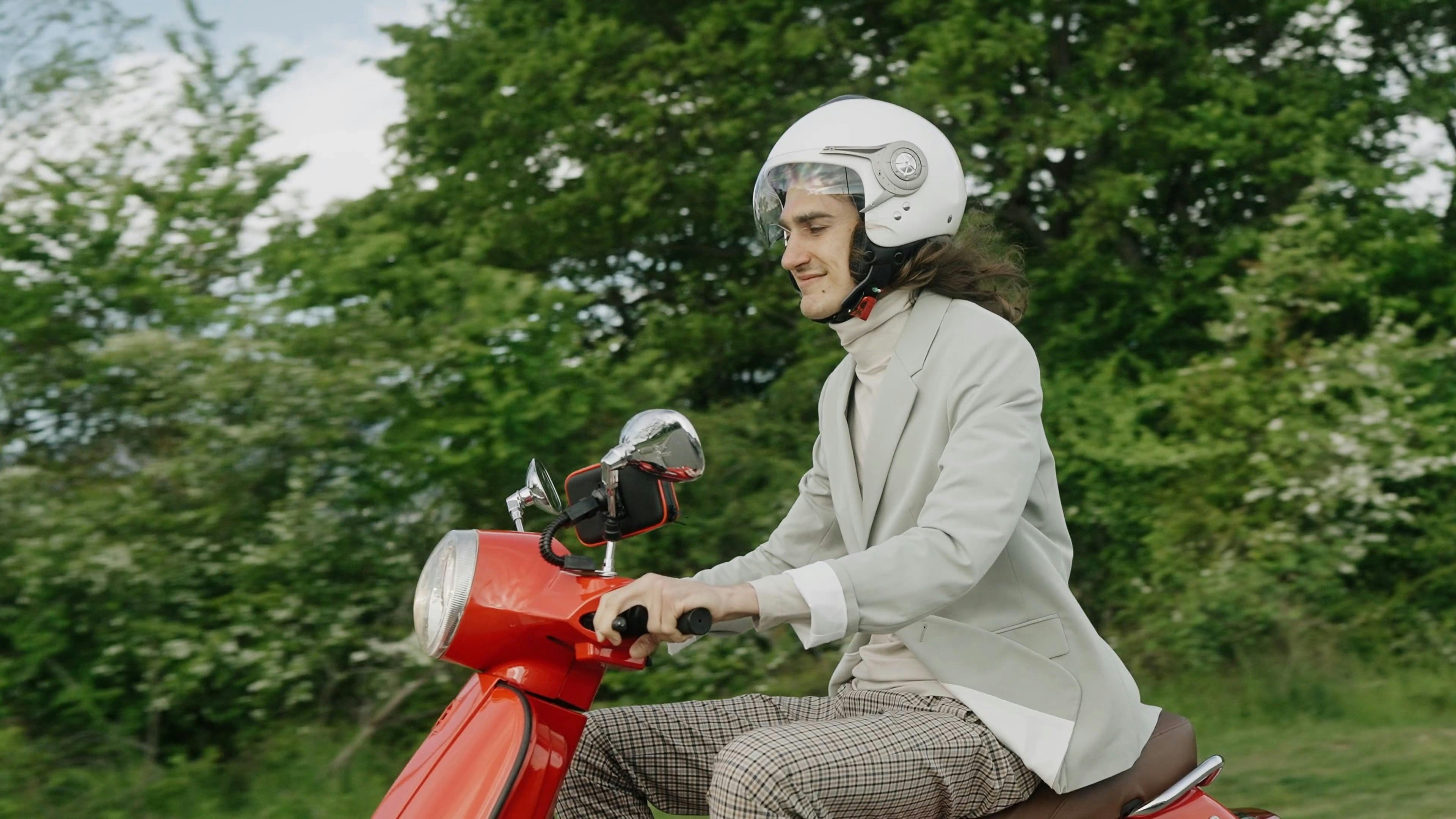 A Man Riding A Moped Free Stock Video Footage, Royalty-Free 4K & HD ...