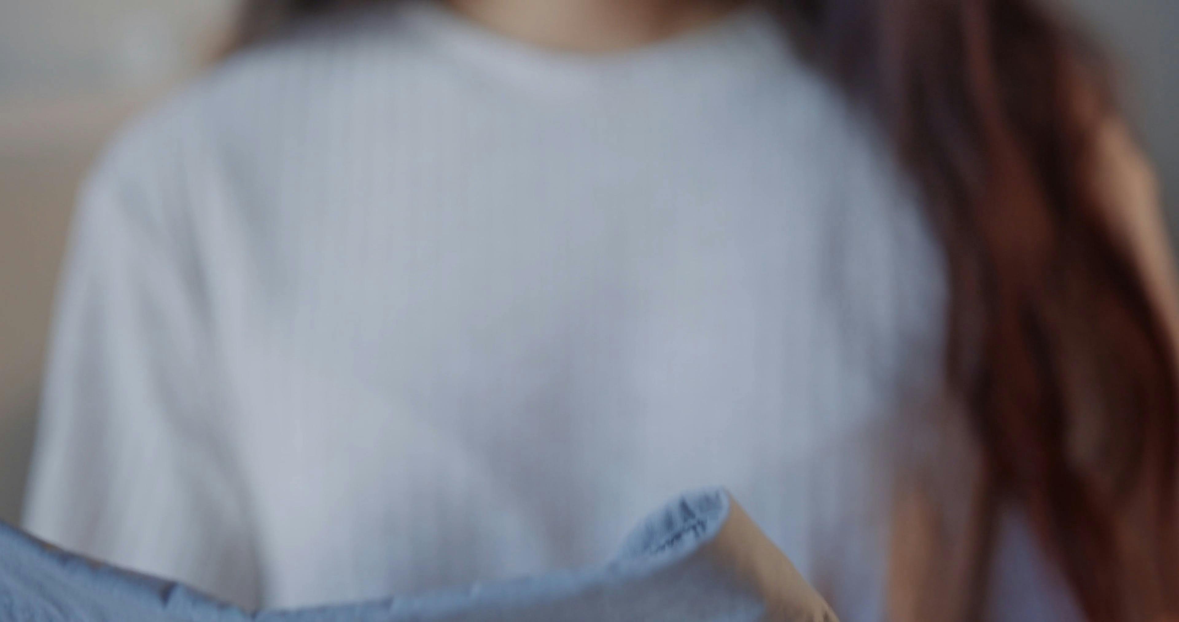 Close up of a Woman Smelling a Shirt Free Stock Video Footage, Royalty ...
