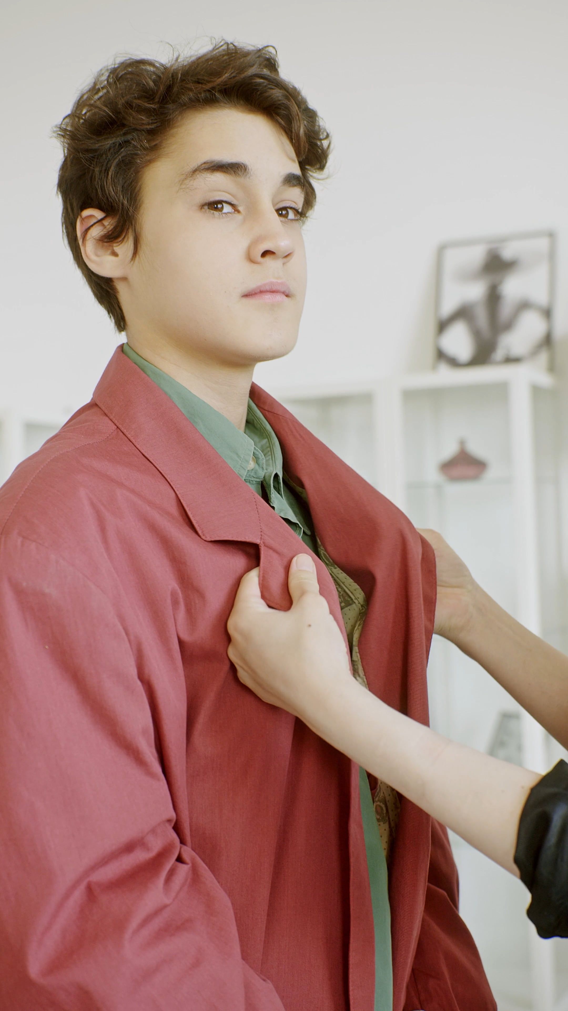 A Mother Stylist Tries on Clothes for her Son Free Stock Video Footage ...