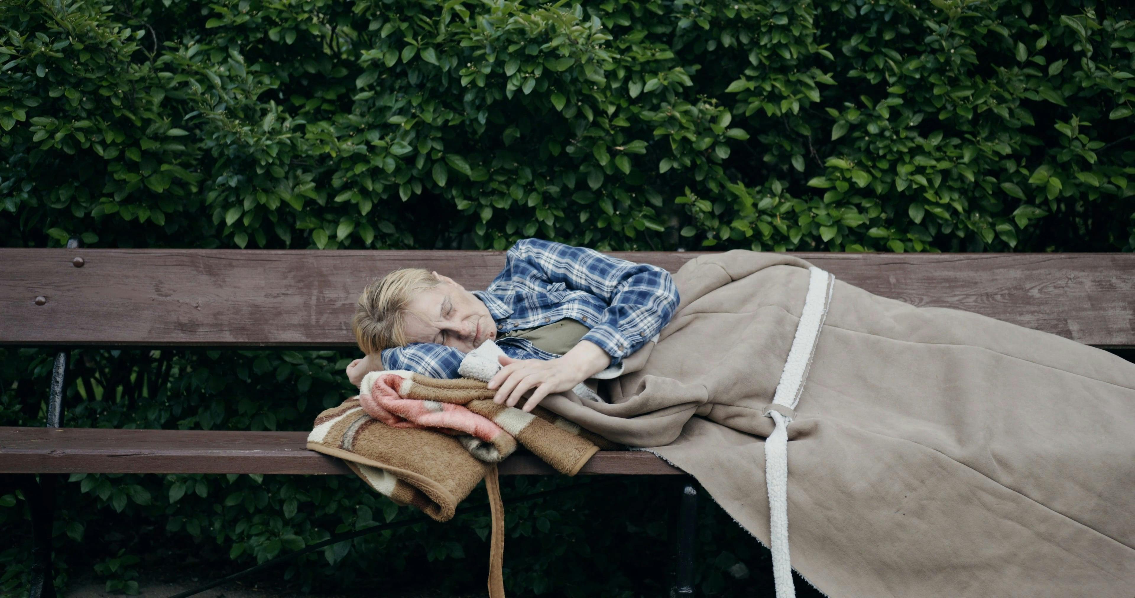 A Woman Sleeping on the Bench in the Park Free Stock Video Footage ...