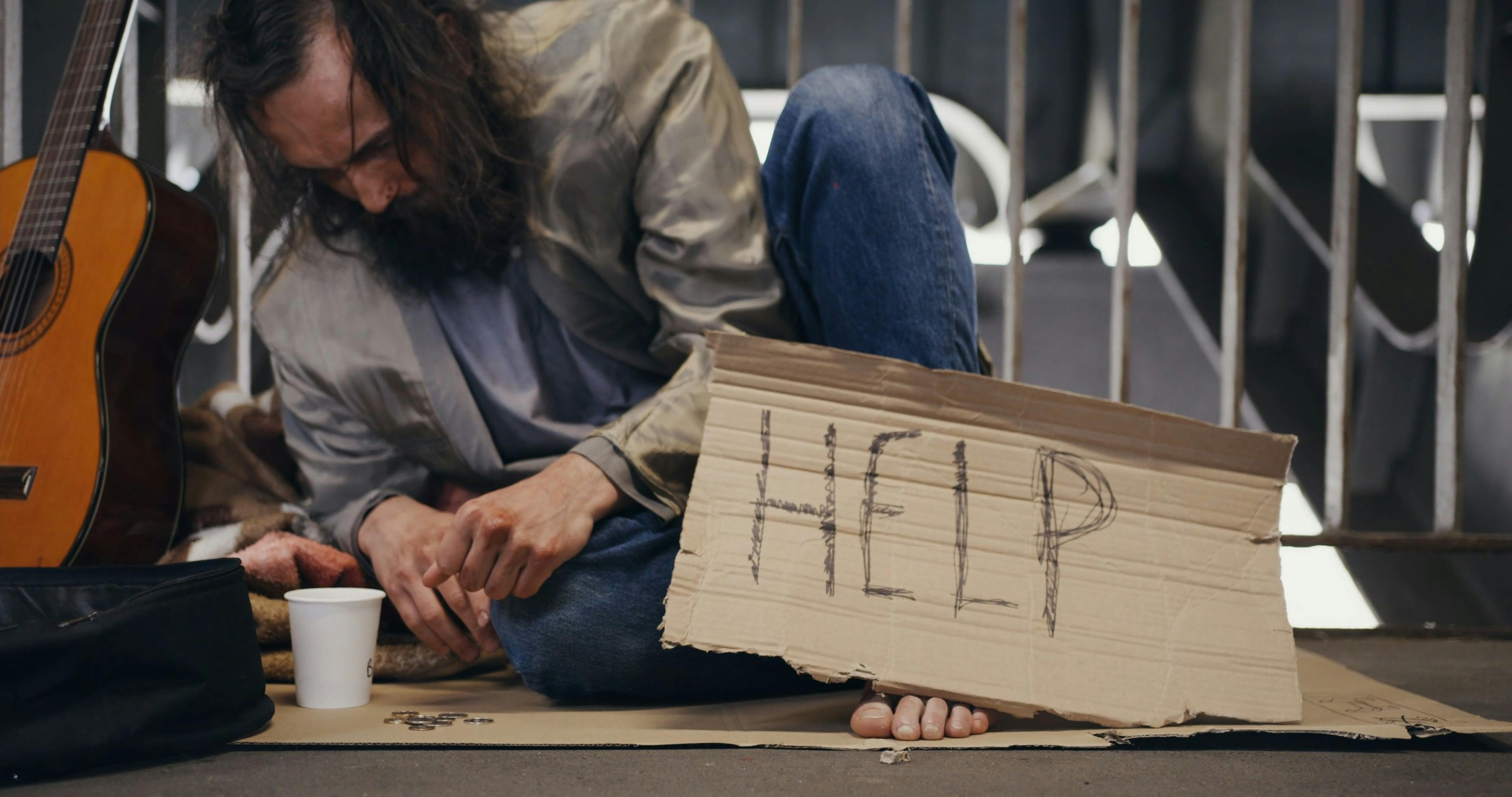 Homeless Person Counting Coins · Free Stock Video