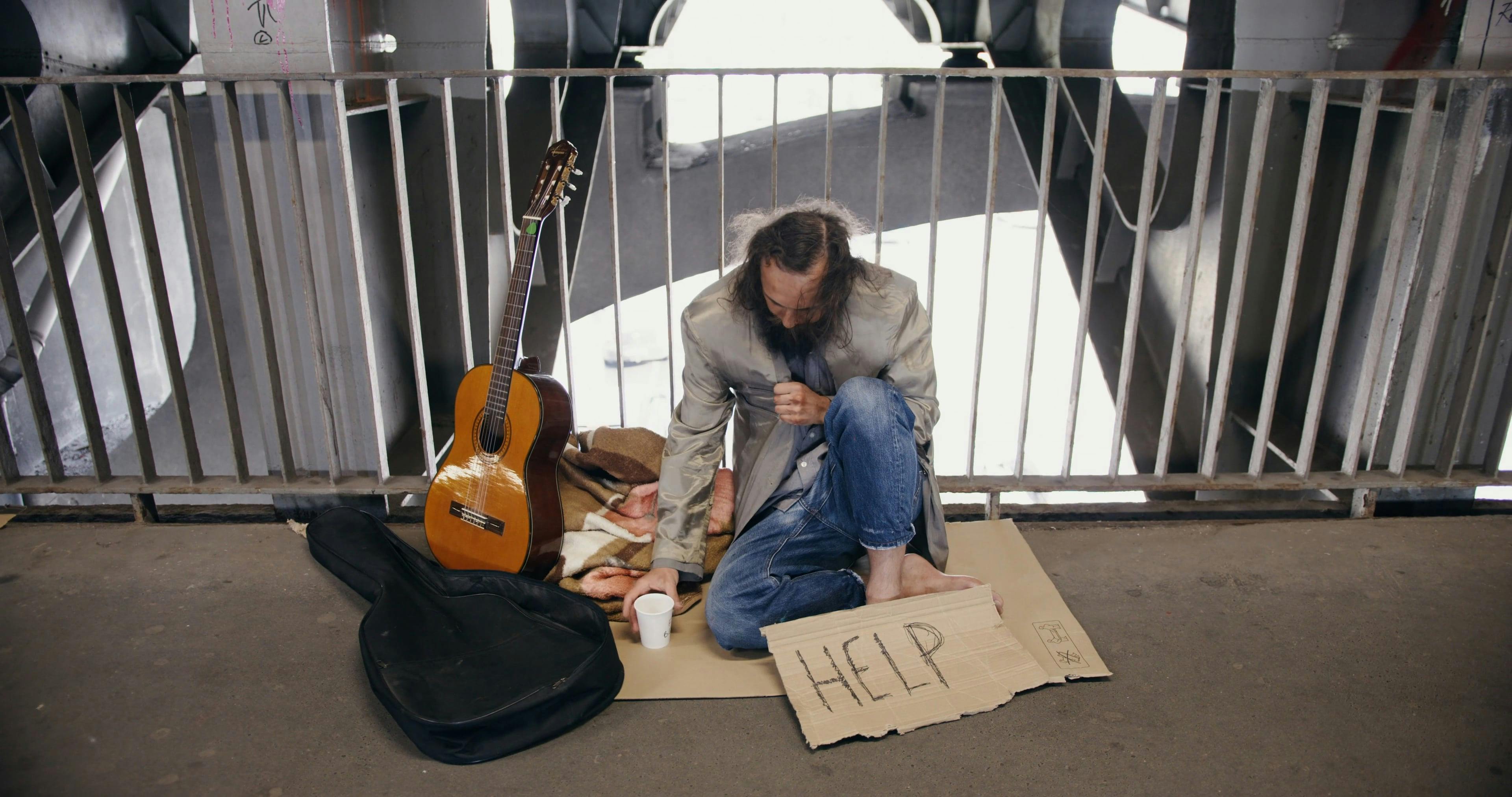 A Homeless Man on a Bridge Free Stock Video Footage, Royalty-Free 4K ...