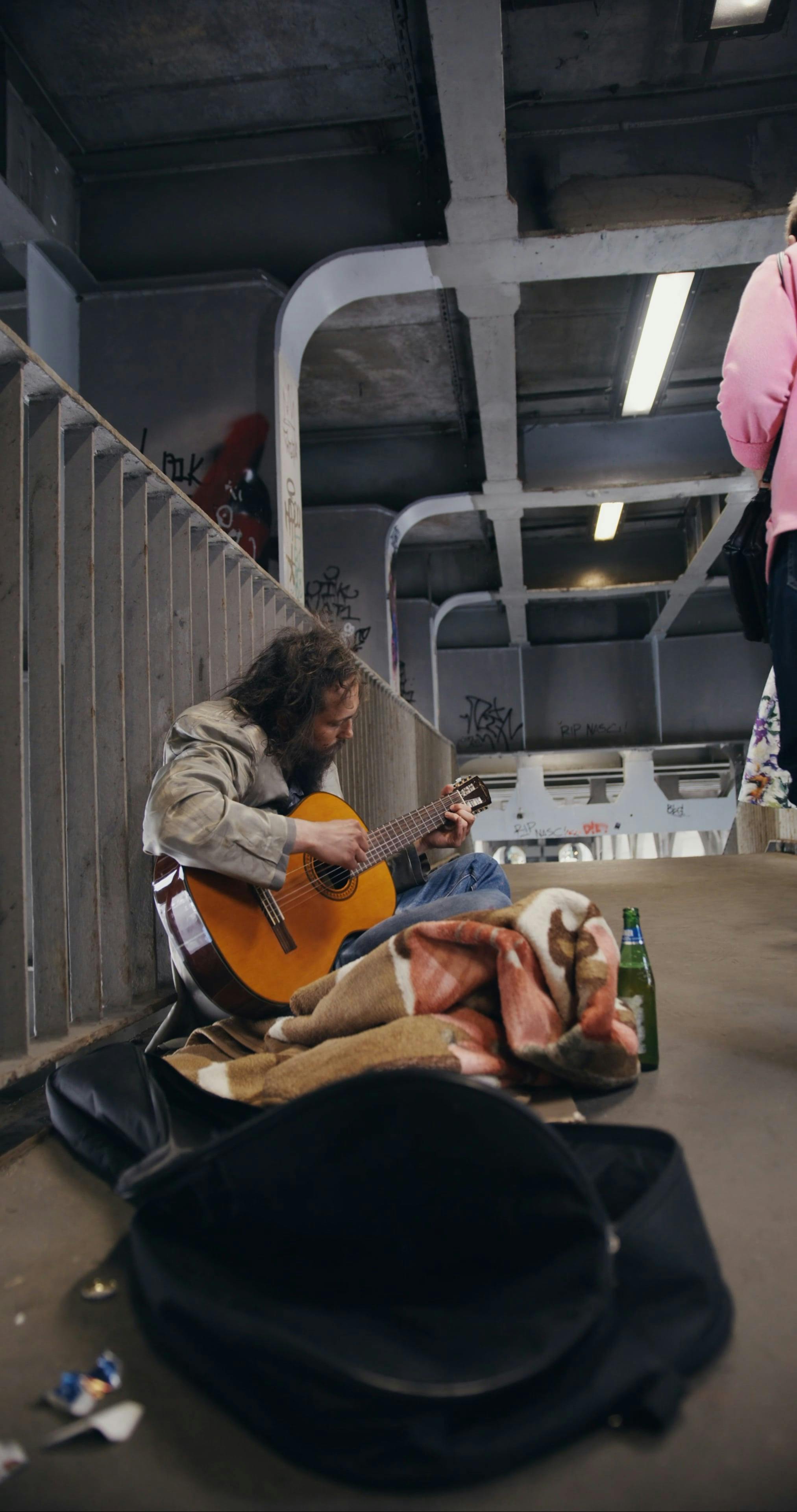 A Homeless Man Playing Guitar Free Stock Video Footage, Royalty-Free 4K ...