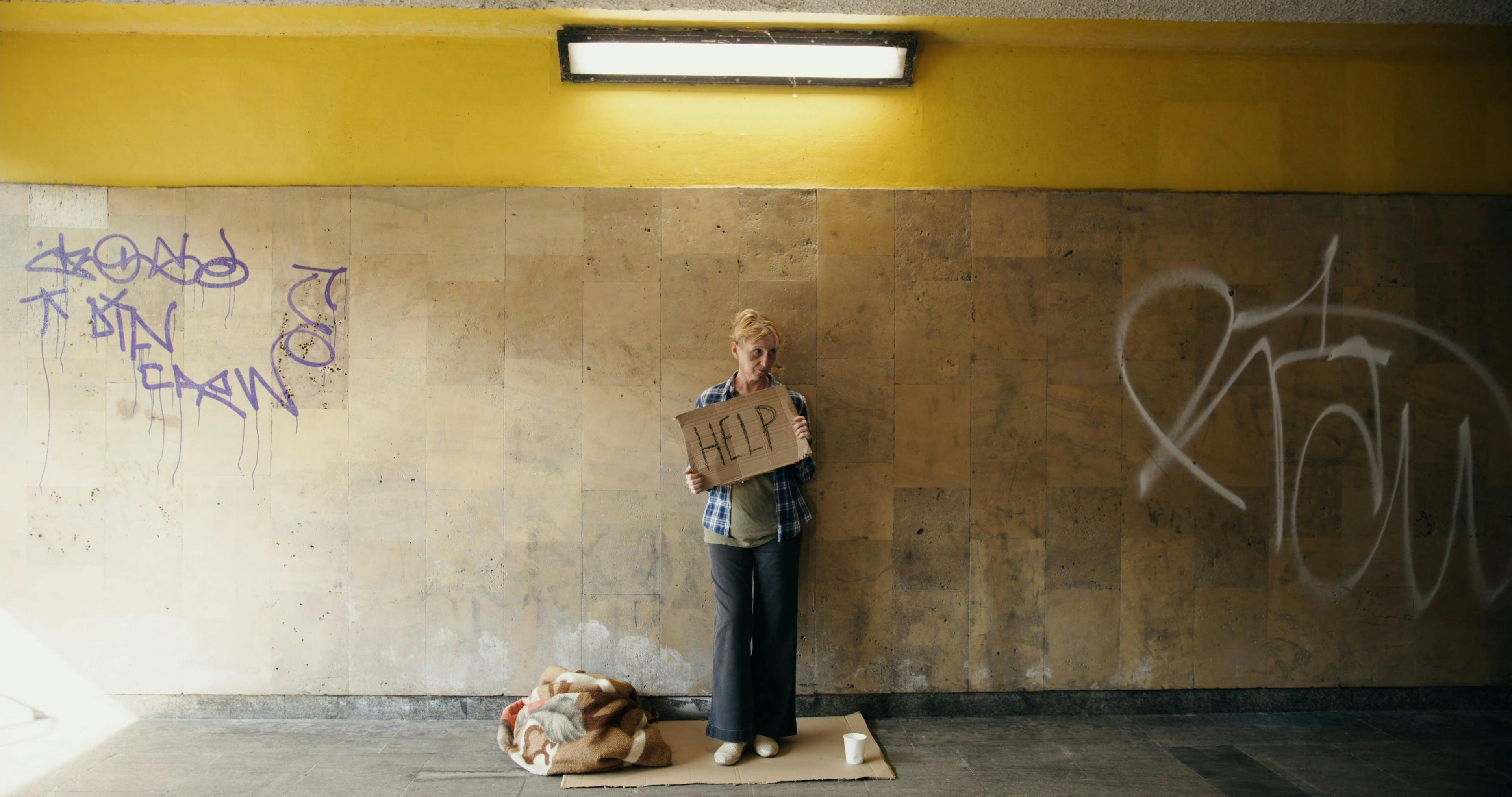 A Beggar Holding a Sign Free Stock Video Footage, Royalty-Free 4K & HD ...