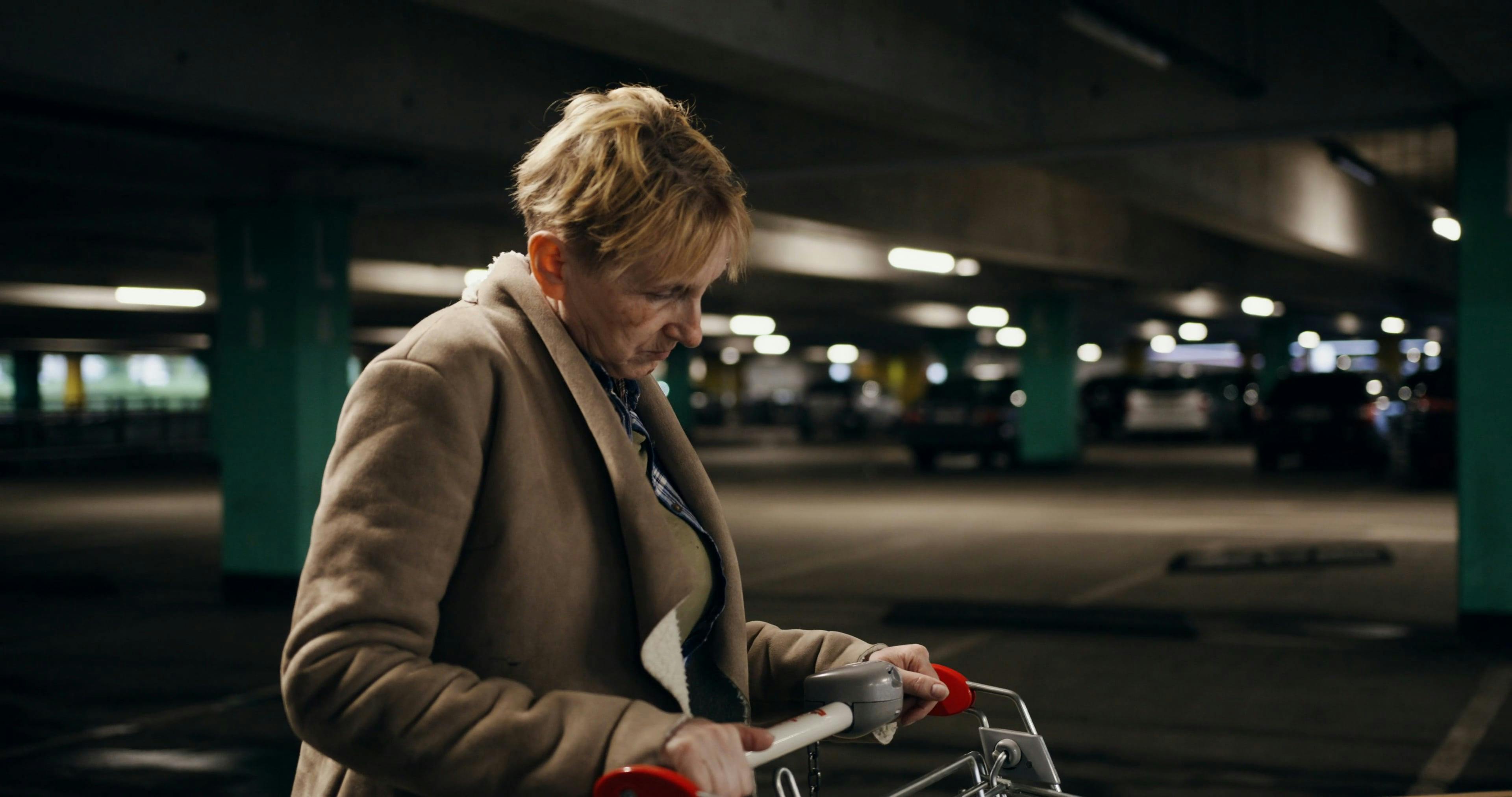 A Homeless Man Pushing a Shopping Cart · Free Stock Video