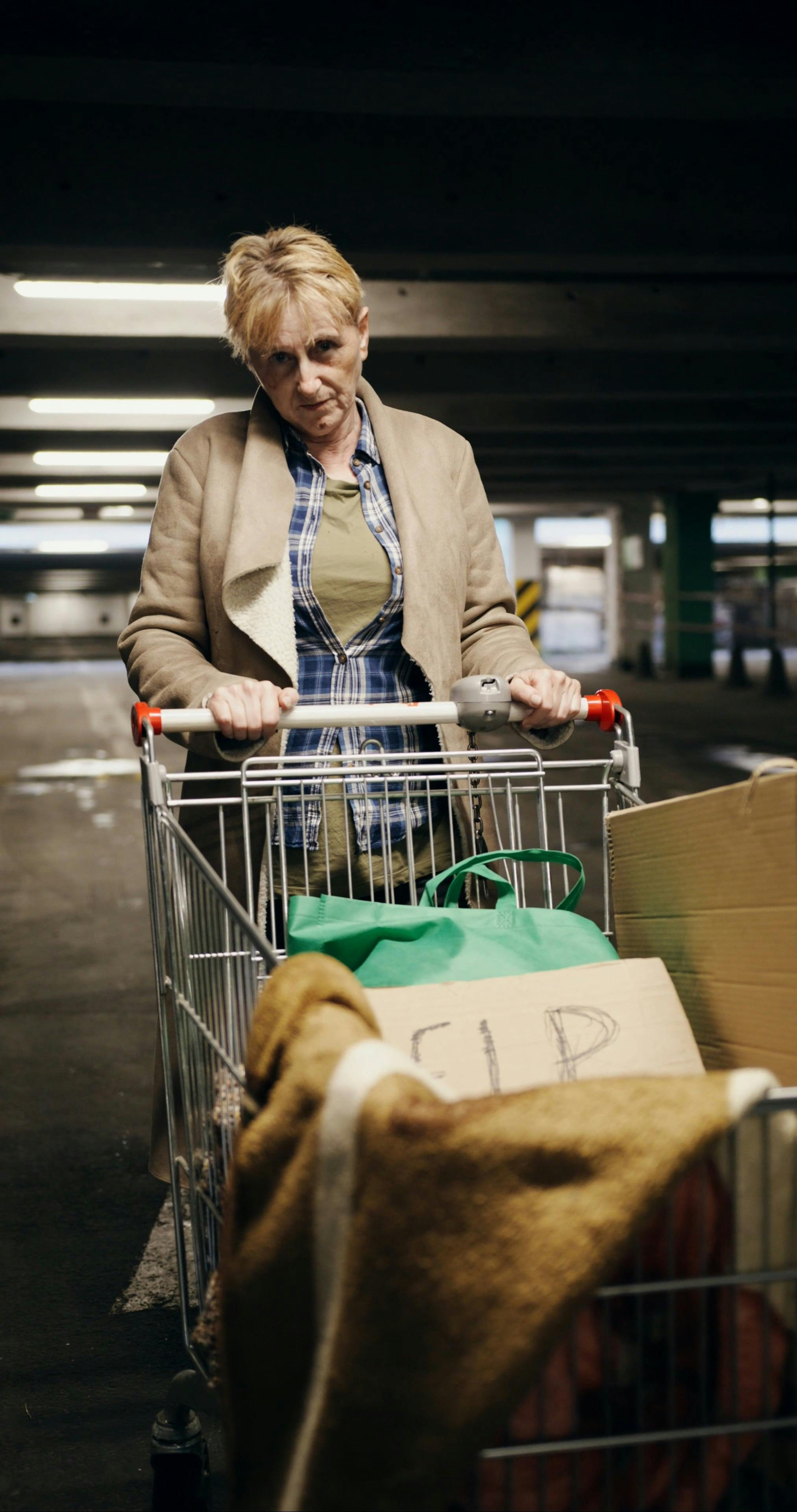 A Homeless Woman Pushing A Shopping Cart · Free Stock Video