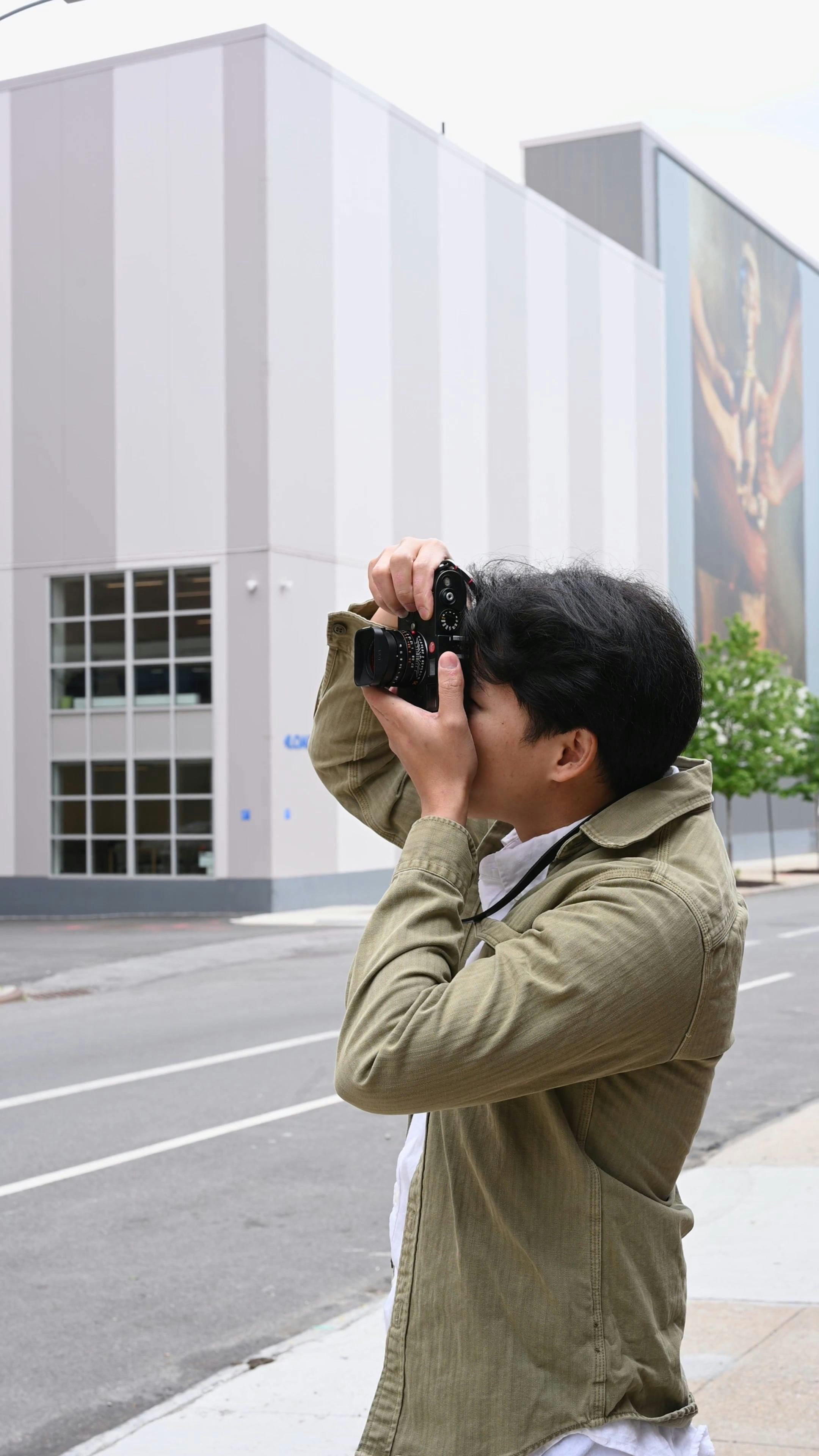 Side View of a Man Taking Pictures Using Camera Free Stock Video ...