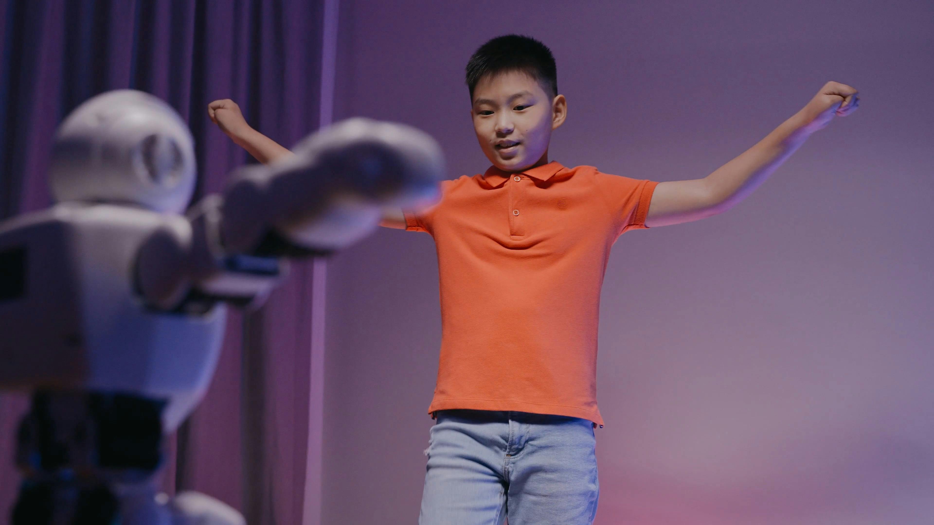 A Boy Imitating a Robot Dancing · Free Stock Video