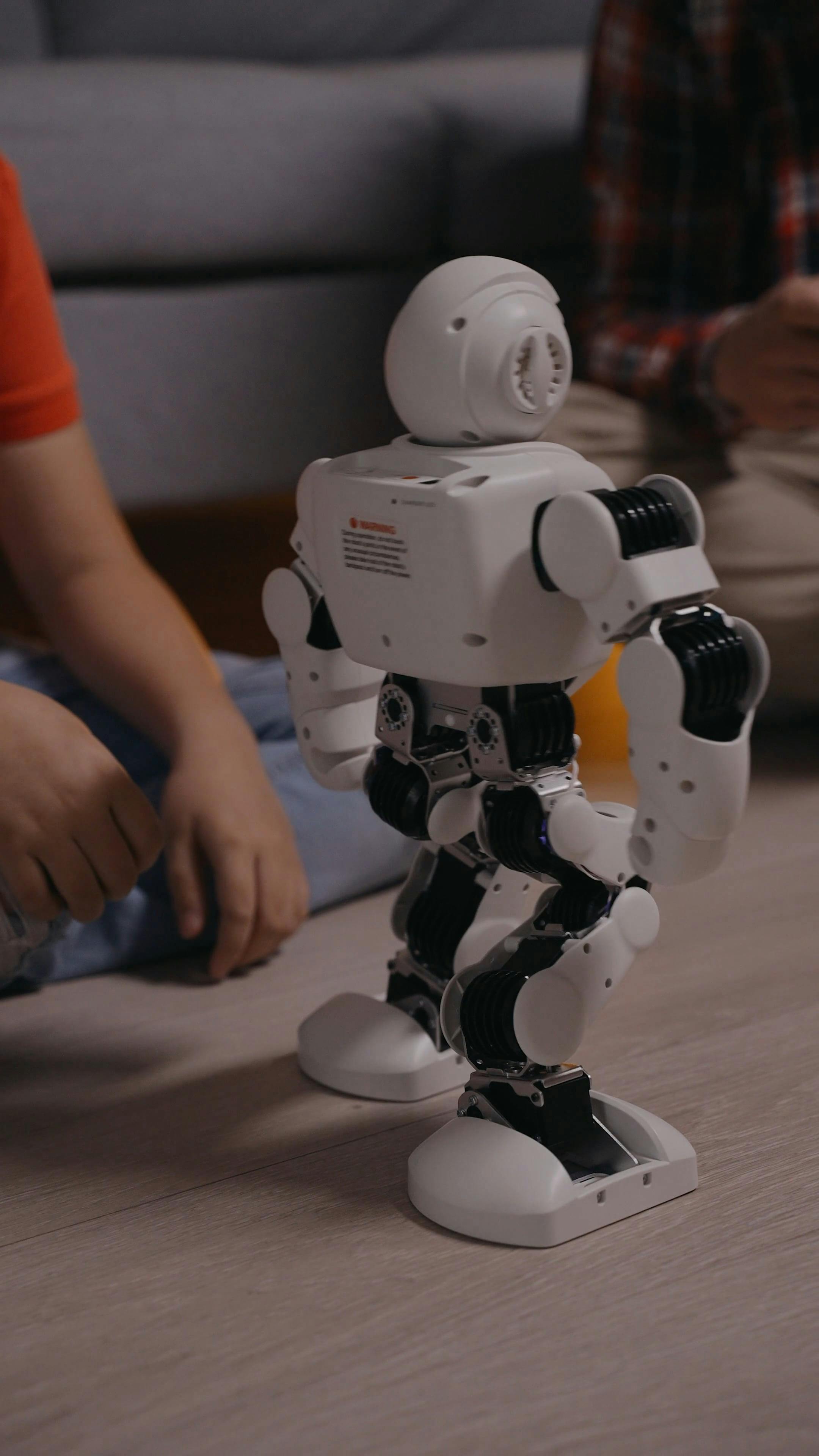 Dad Showing his Son how to Control the Robot Free Stock Video Footage ...