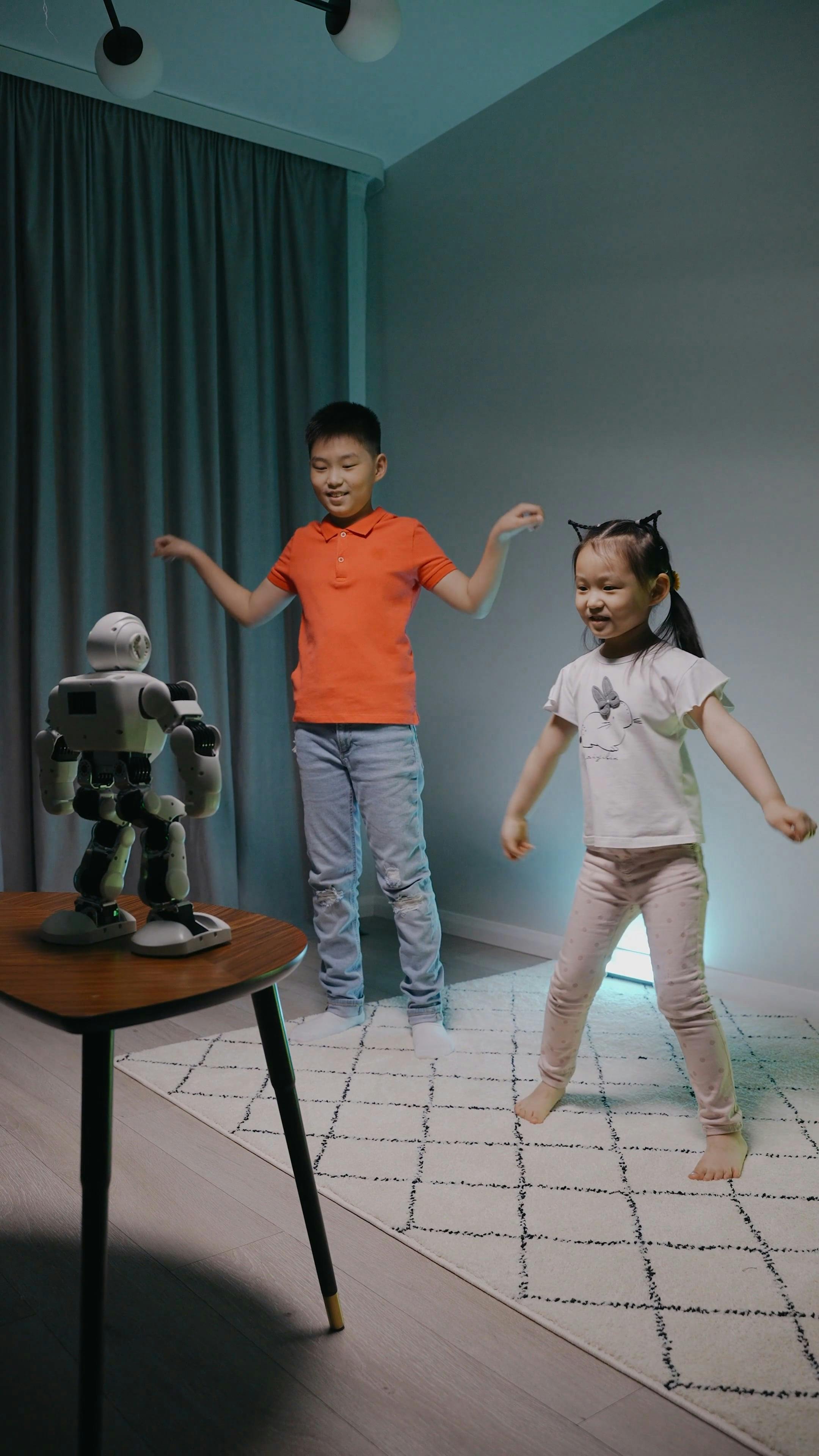 Girl Dancing With A Robot · Free Stock Video