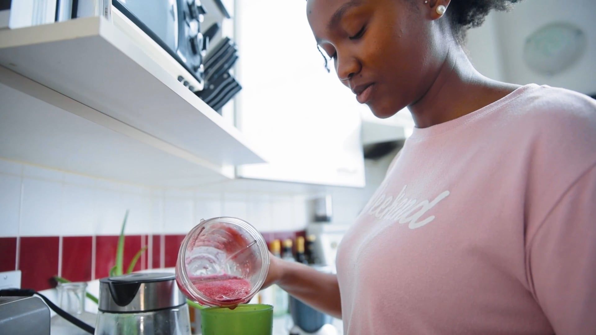 A Woman Pouring a Shake into a Cup Free Stock Video Footage, Royalty ...