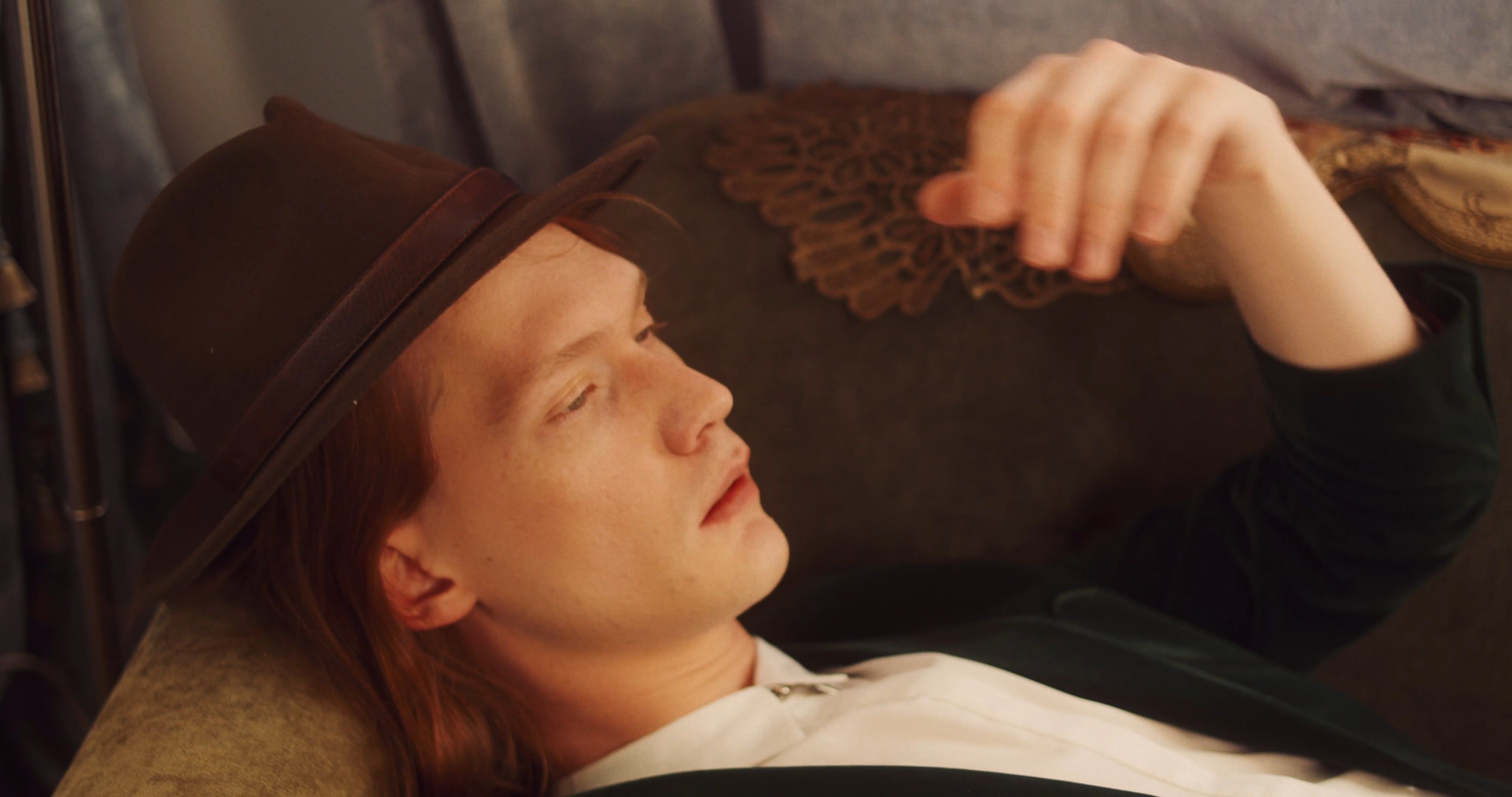 Man Covering his Face using Cowboy hat while Lying on Sofa · Free Stock ...