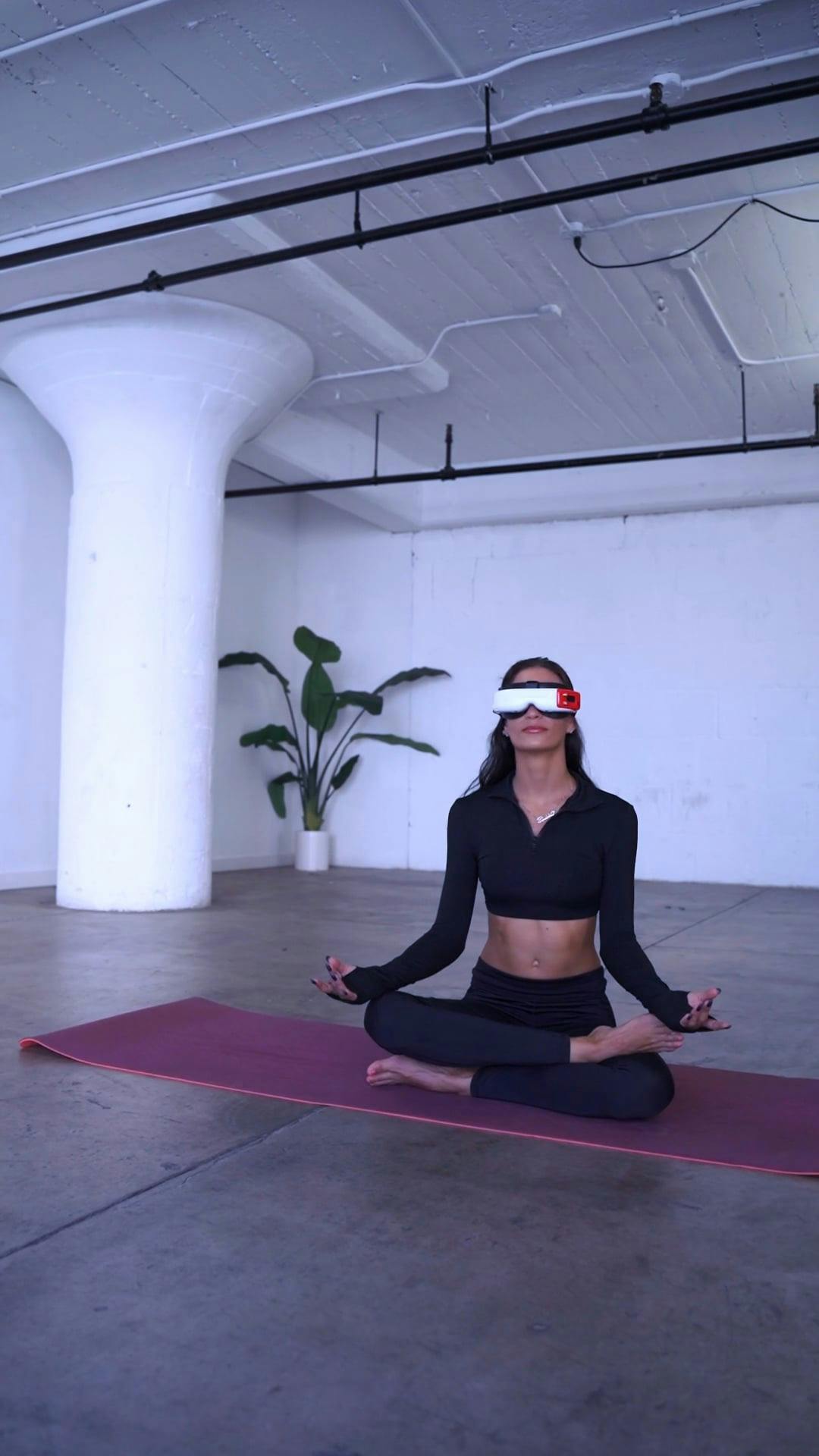 A Woman in a Yoga Pose While Wearing VR Glasses · Free Stock Video