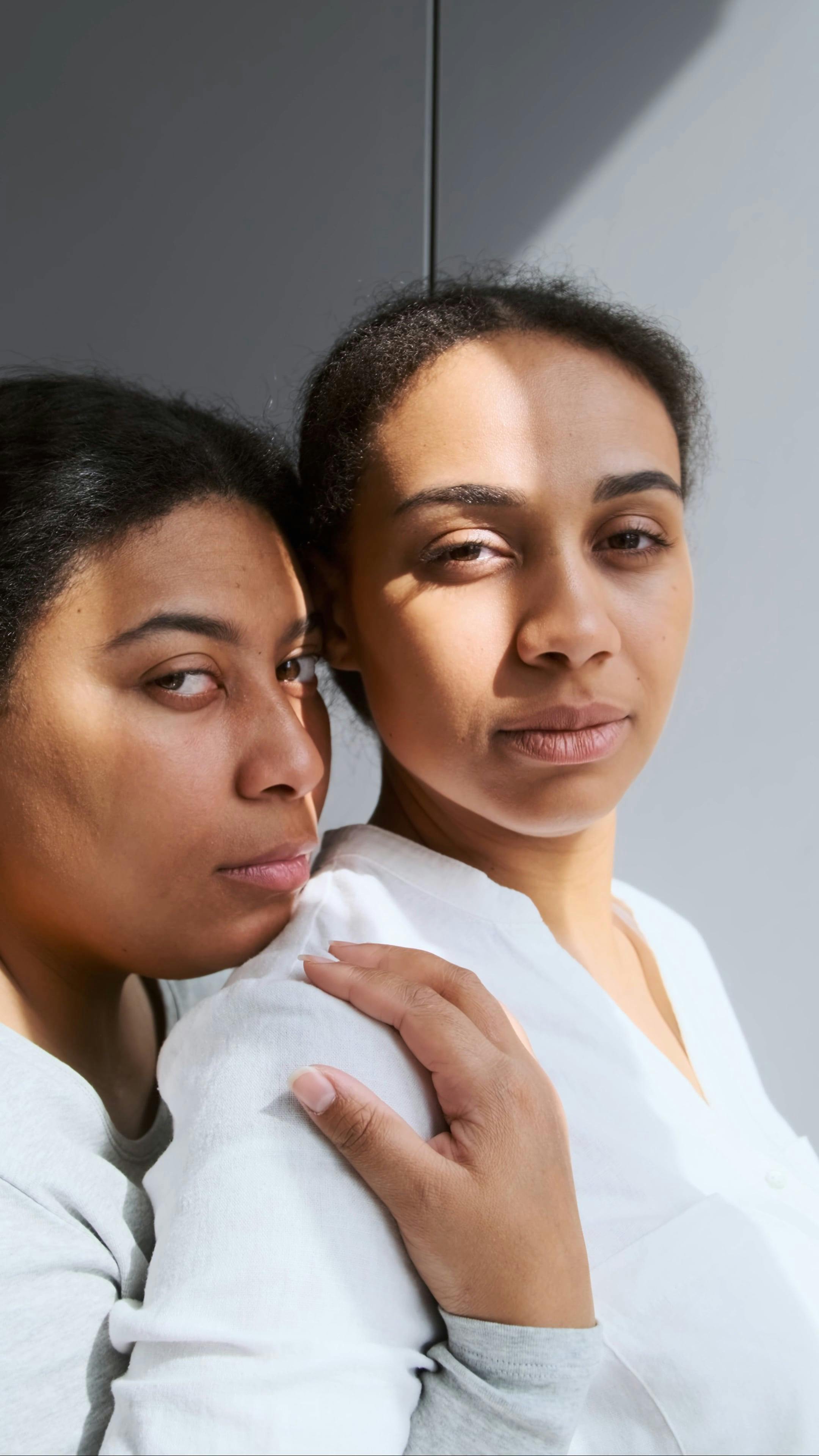 Two Women Posing Together · Free Stock Video