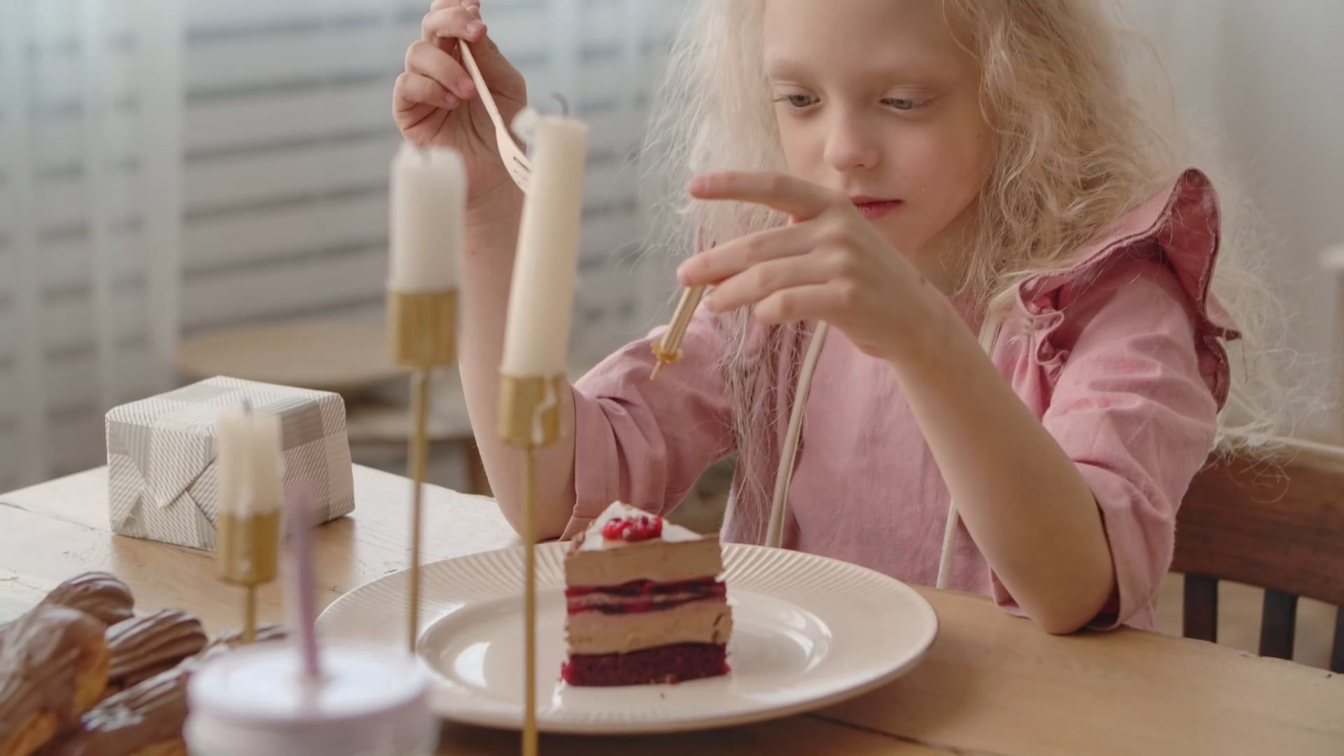 A Girl Enjoying Eating a Cake · Free Stock Video