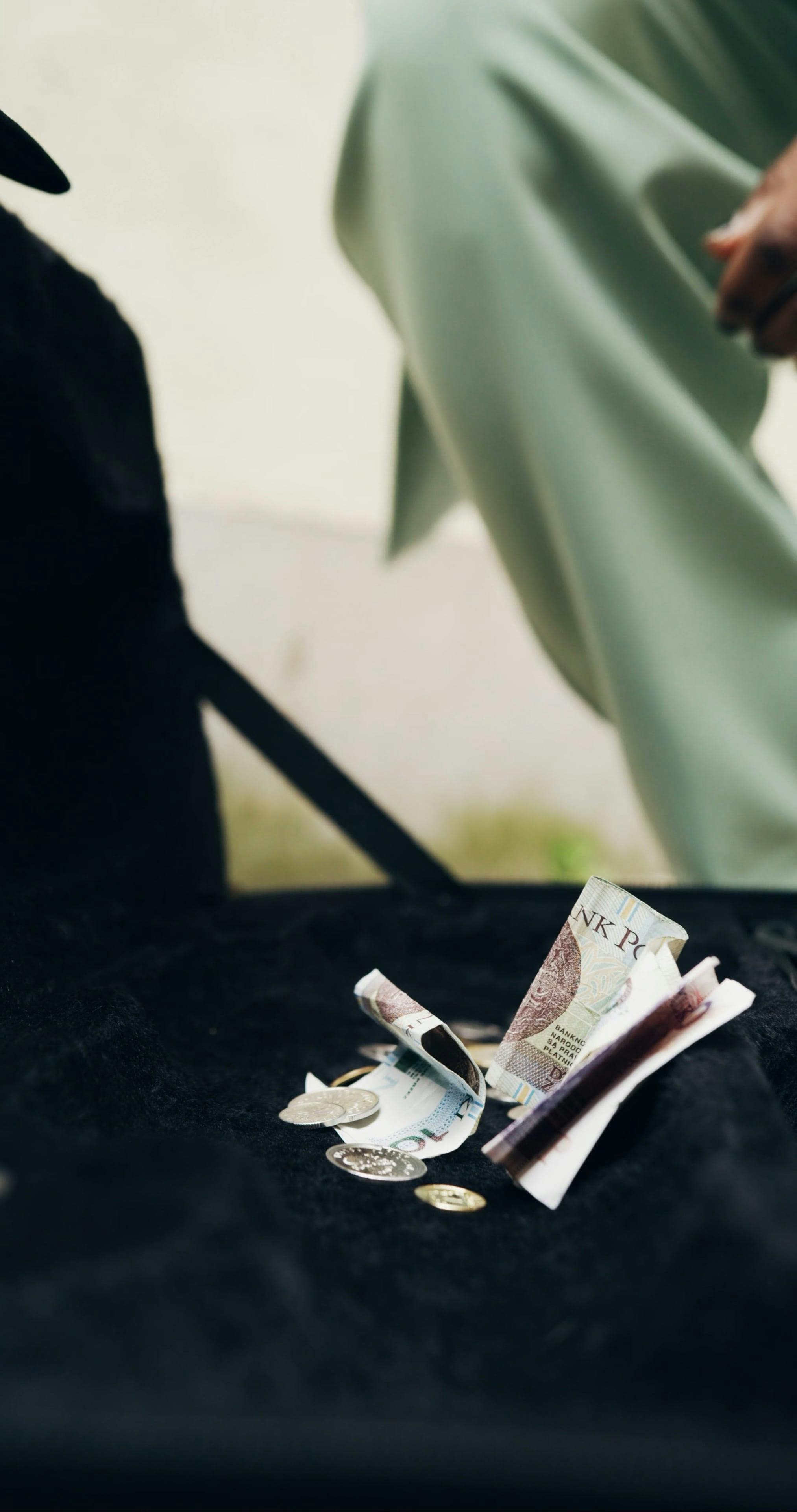 Person Taking Money from a Guitar Casing · Free Stock Video