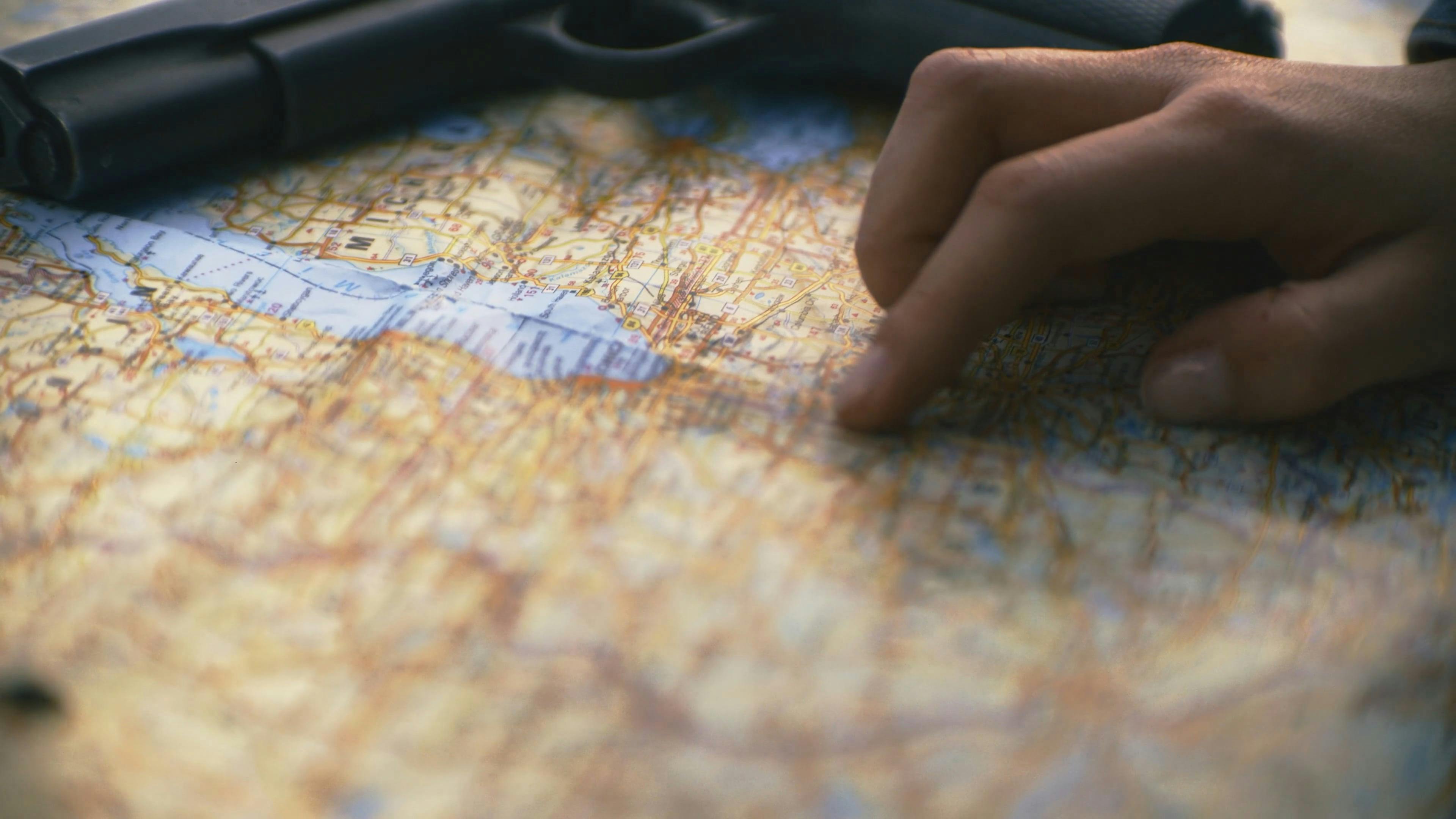 Robbers Looking at a Map while Planning their Next Robber · Free Stock ...