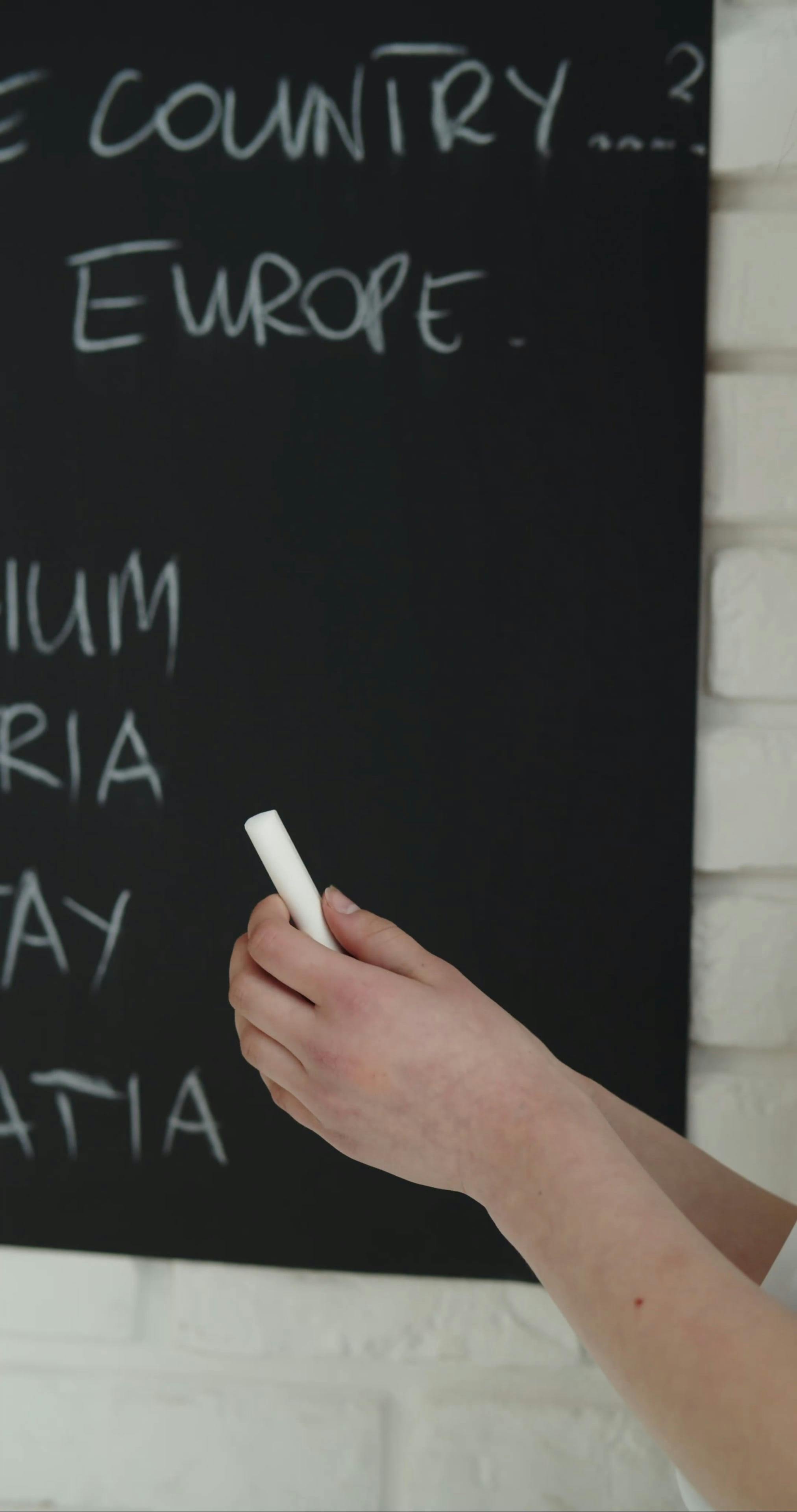 A Person Holding Chalk · Free Stock Video