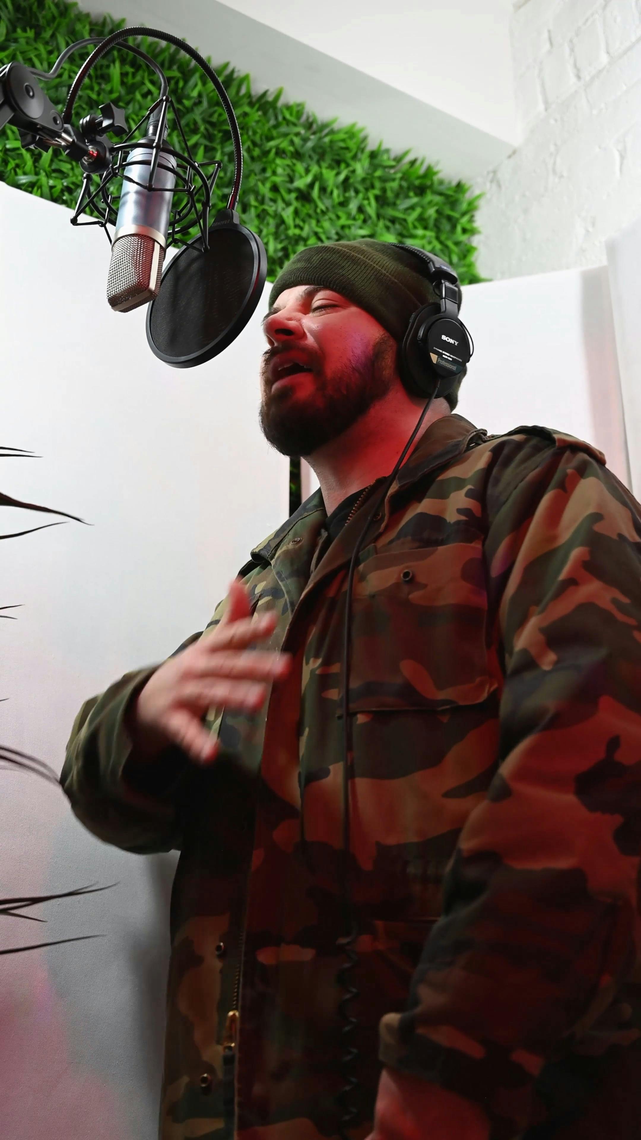 A Man in Headphones Rapping in a Studio Free Stock Video Footage ...