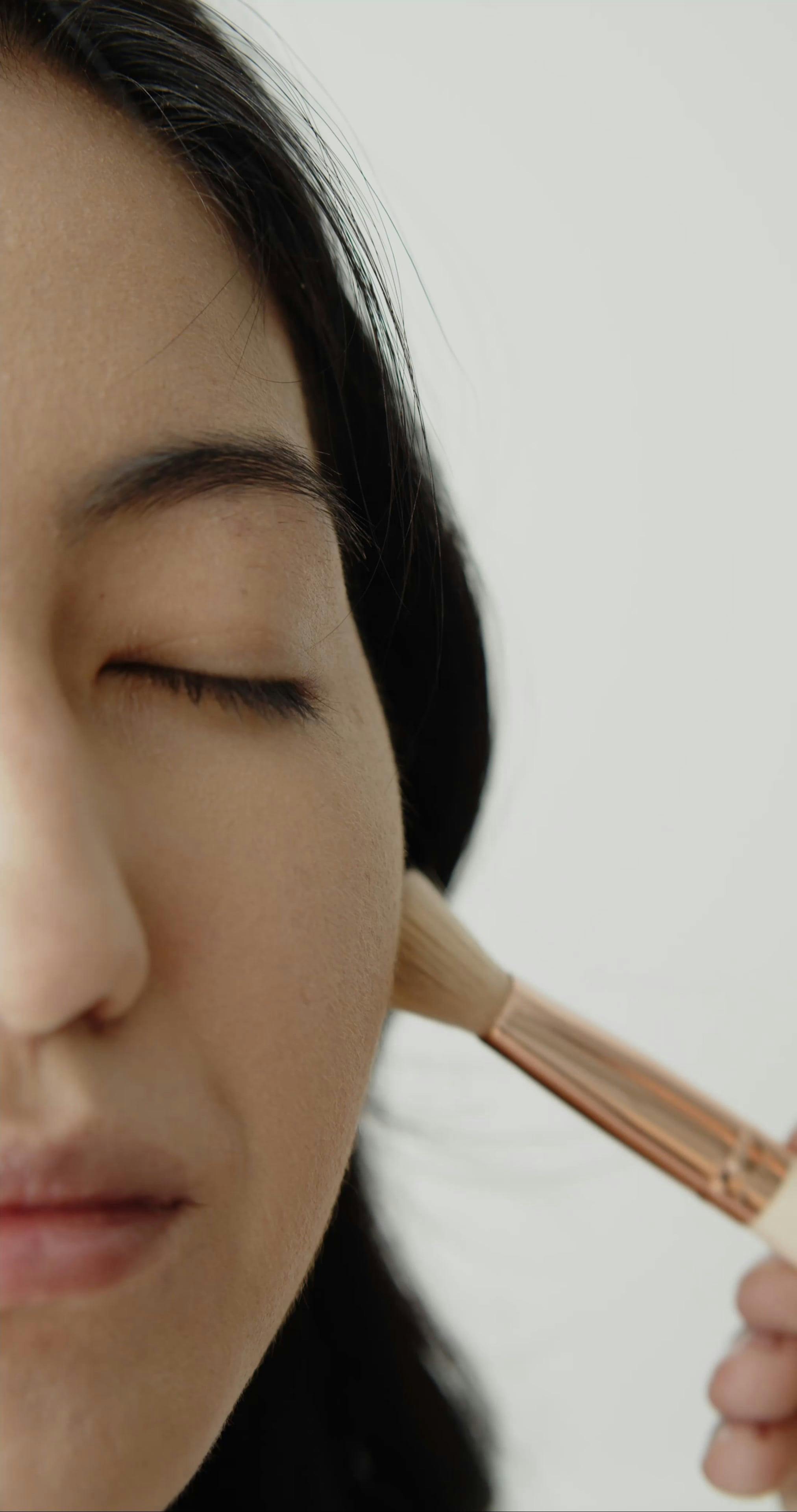 A Makeup Artist Applying Makeup On A Model · Free Stock Video