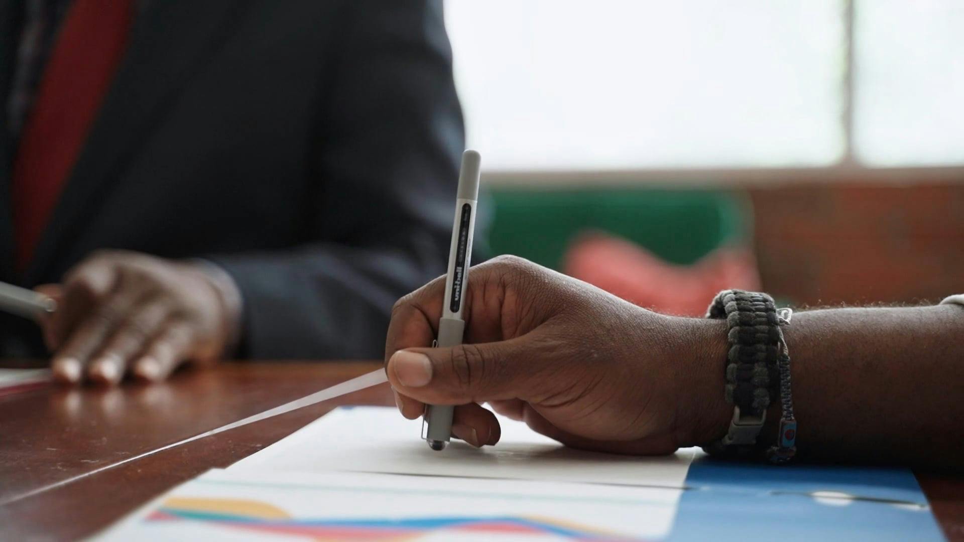 A Man Tapping His Pen on the Table Free Stock Video Footage, Royalty ...